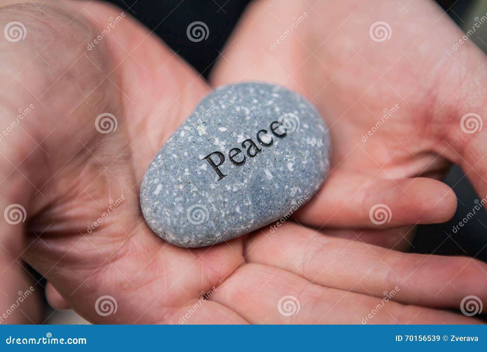 Inner Balance Concept: Hands Holding Stones with the Word Peace Stock ...