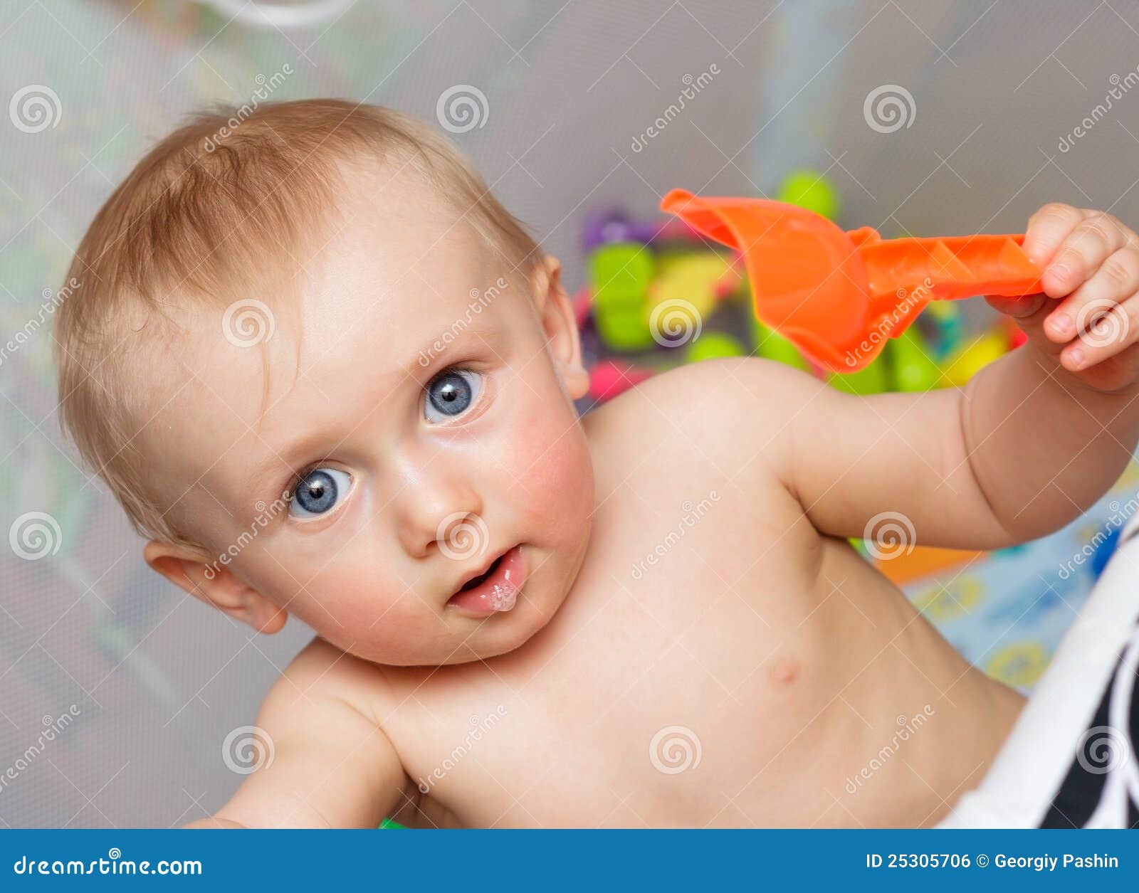 Innocent baby boy plays stock photo. Image of childhood - 25305706