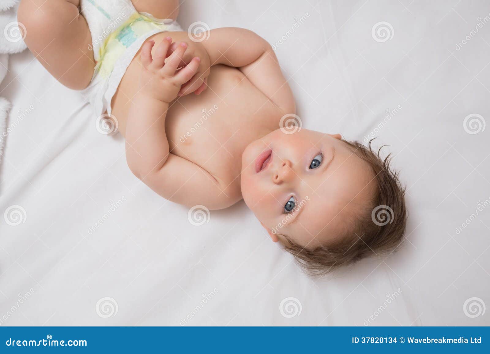 Innocent Baby Wrapped With A Yellow Towel Royalty-Free Stock Image ...