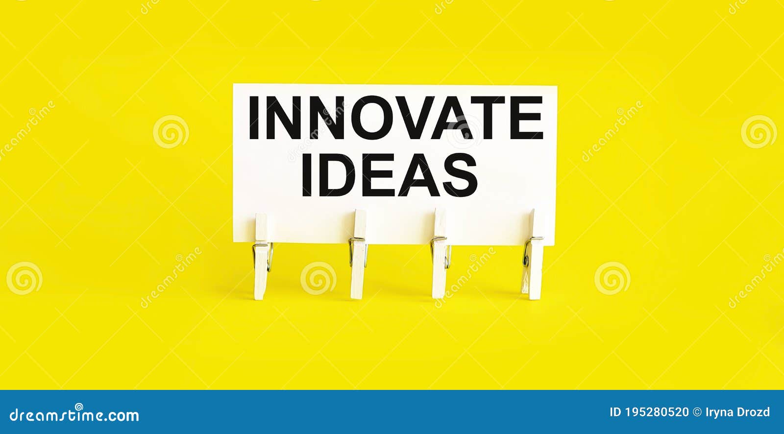 INNOVATE IDEAS , Written on White Sticky Note on Yellow Background ...