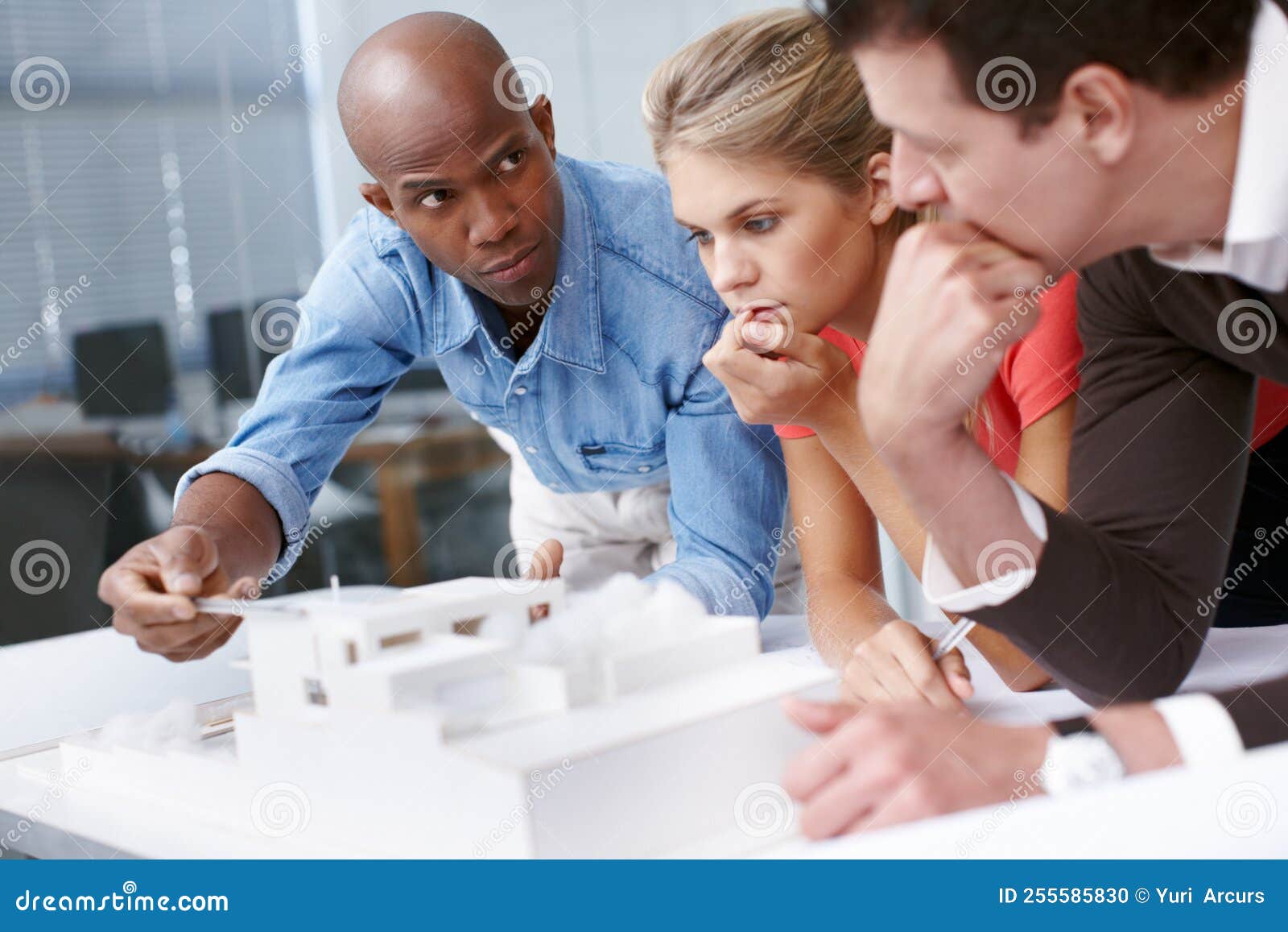 Innovative Designers at Work. a Team of Architects Looking Thoughtful ...