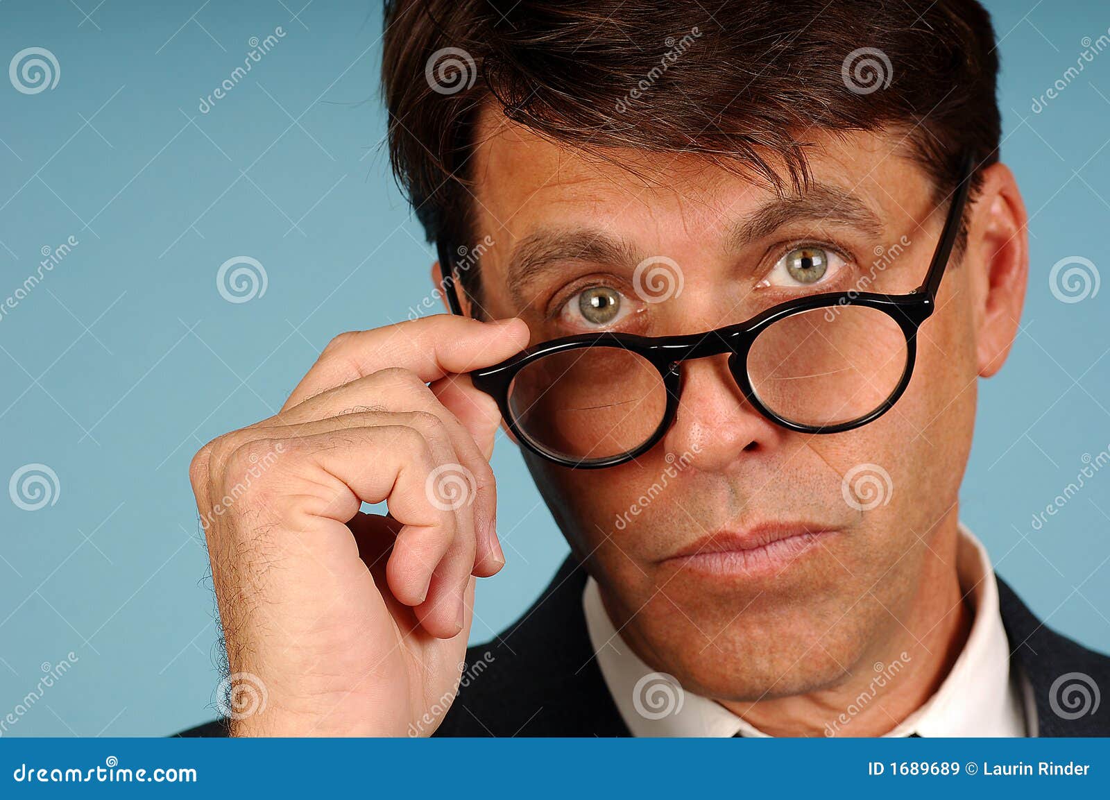 Inquistive Businessman stock image. Image of expression - 1689689