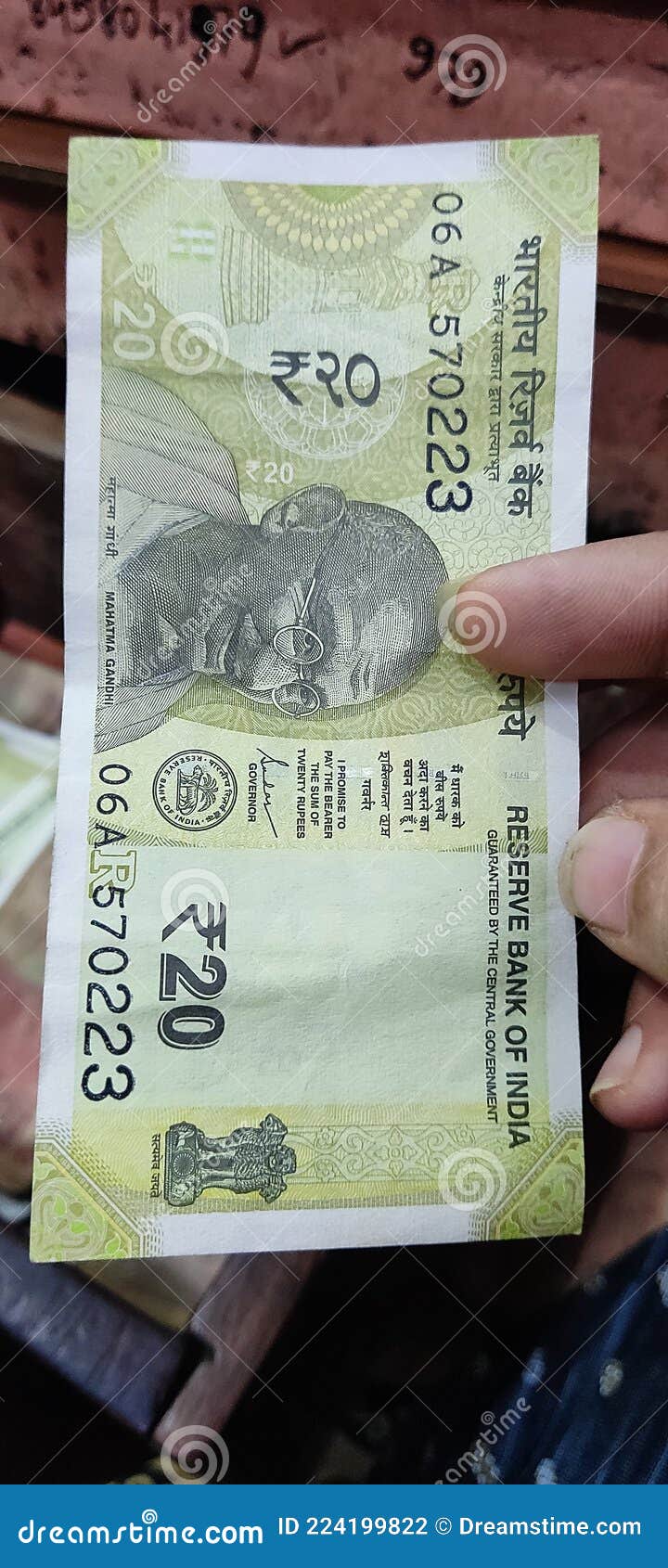 20 INR note held in hand stock photo. Image of indian - 224199822