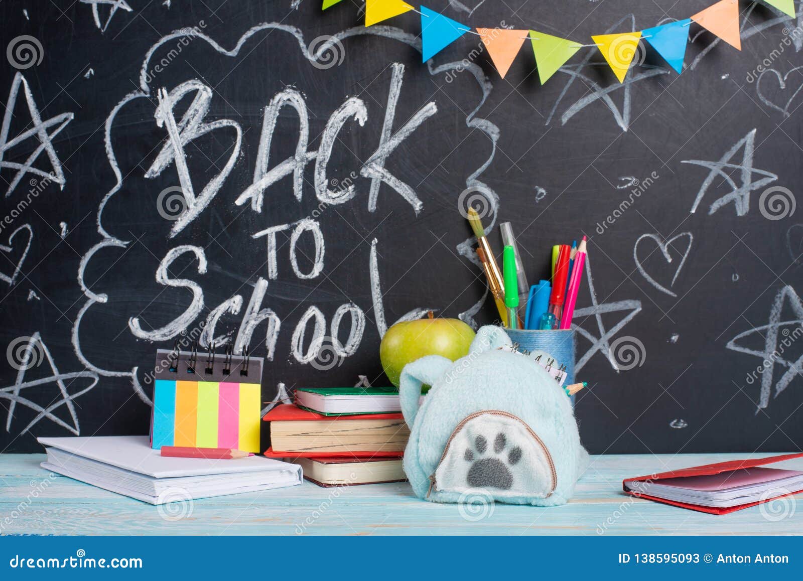 The Inscription Back To School on the Blackboard with School Supplies ...