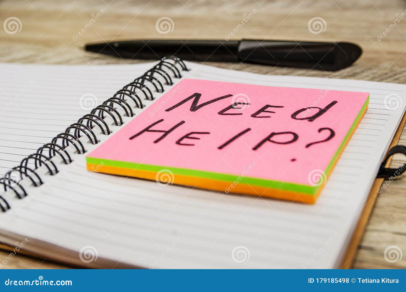 The Inscription I Need Help on the Sticker, an Open Notebook and a ...