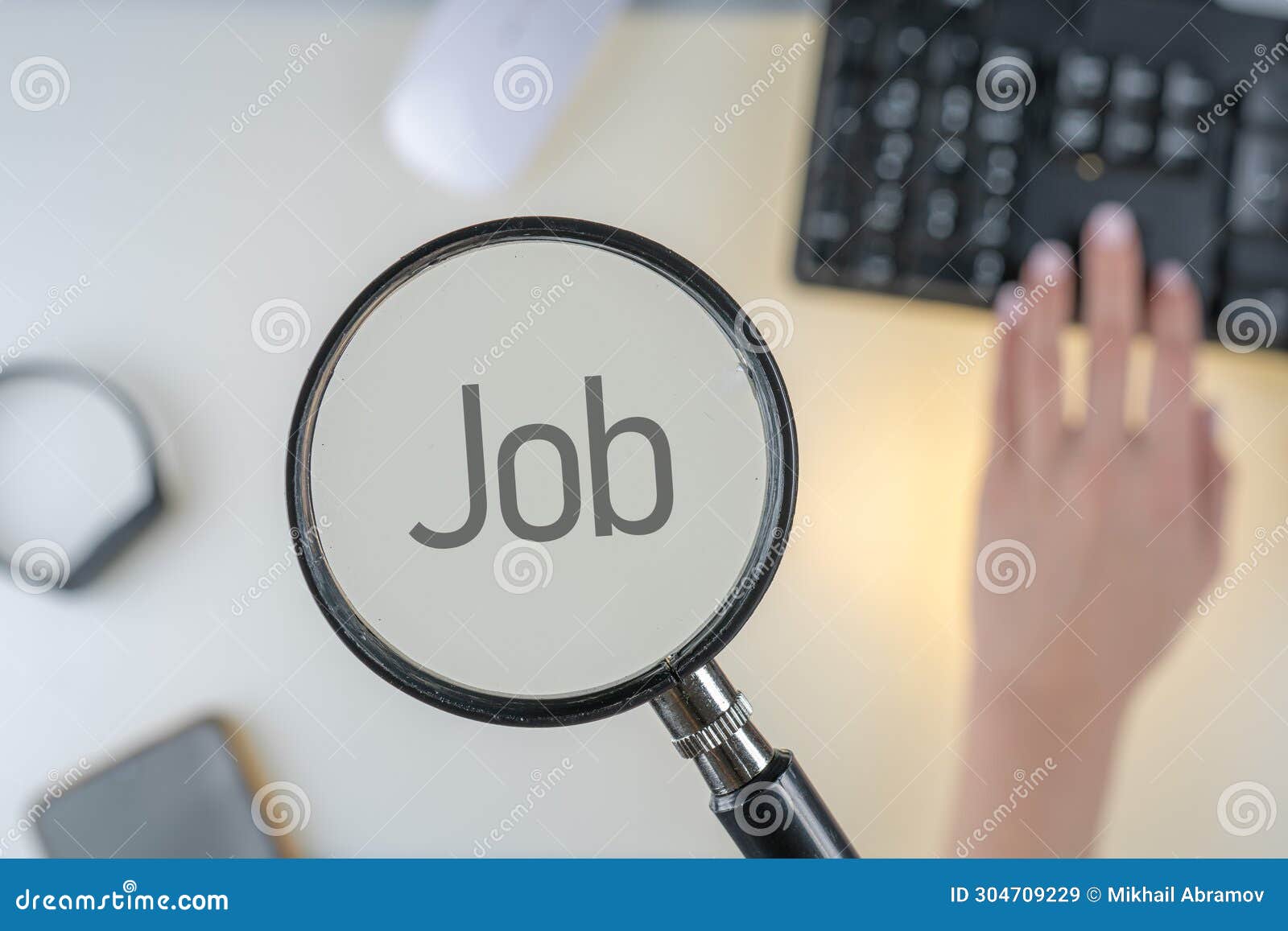 Inscription through a Magnifying Glass JOB. Top View of the Computer ...