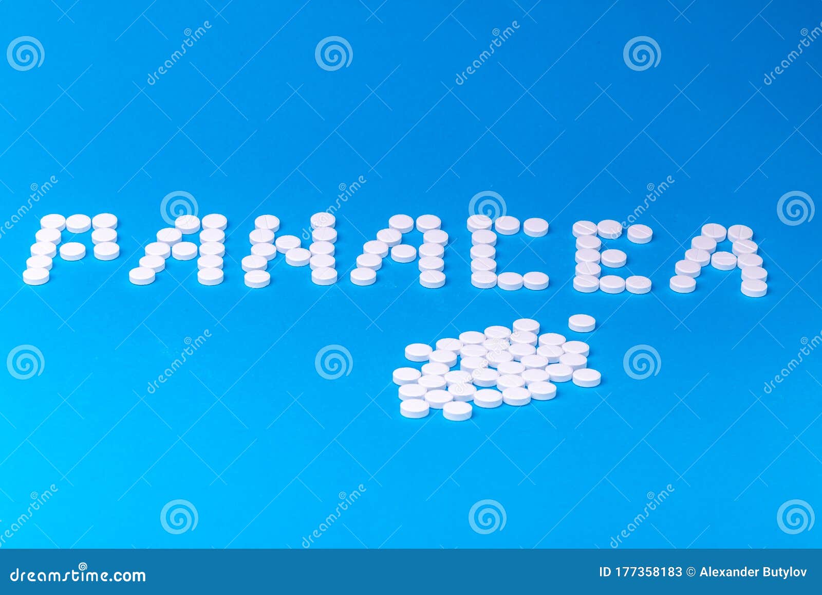 The Inscription "Panacea" Made of Pills on a Blue Background Stock ...