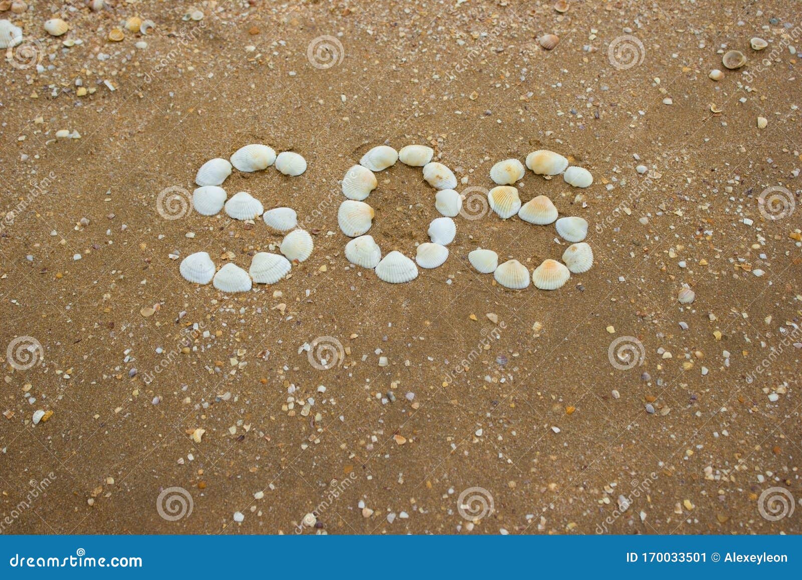 Inscription on Sand from Shells - Sos, Camping, Hiking Danger Stock ...