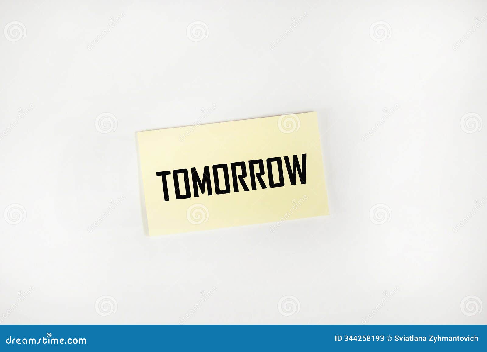 The Inscription "tomorrow" on a Yellow Sticker with a White Background ...