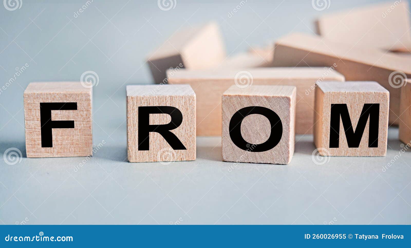 From - the Inscription on Wooden Cubes on a White Background Stock ...