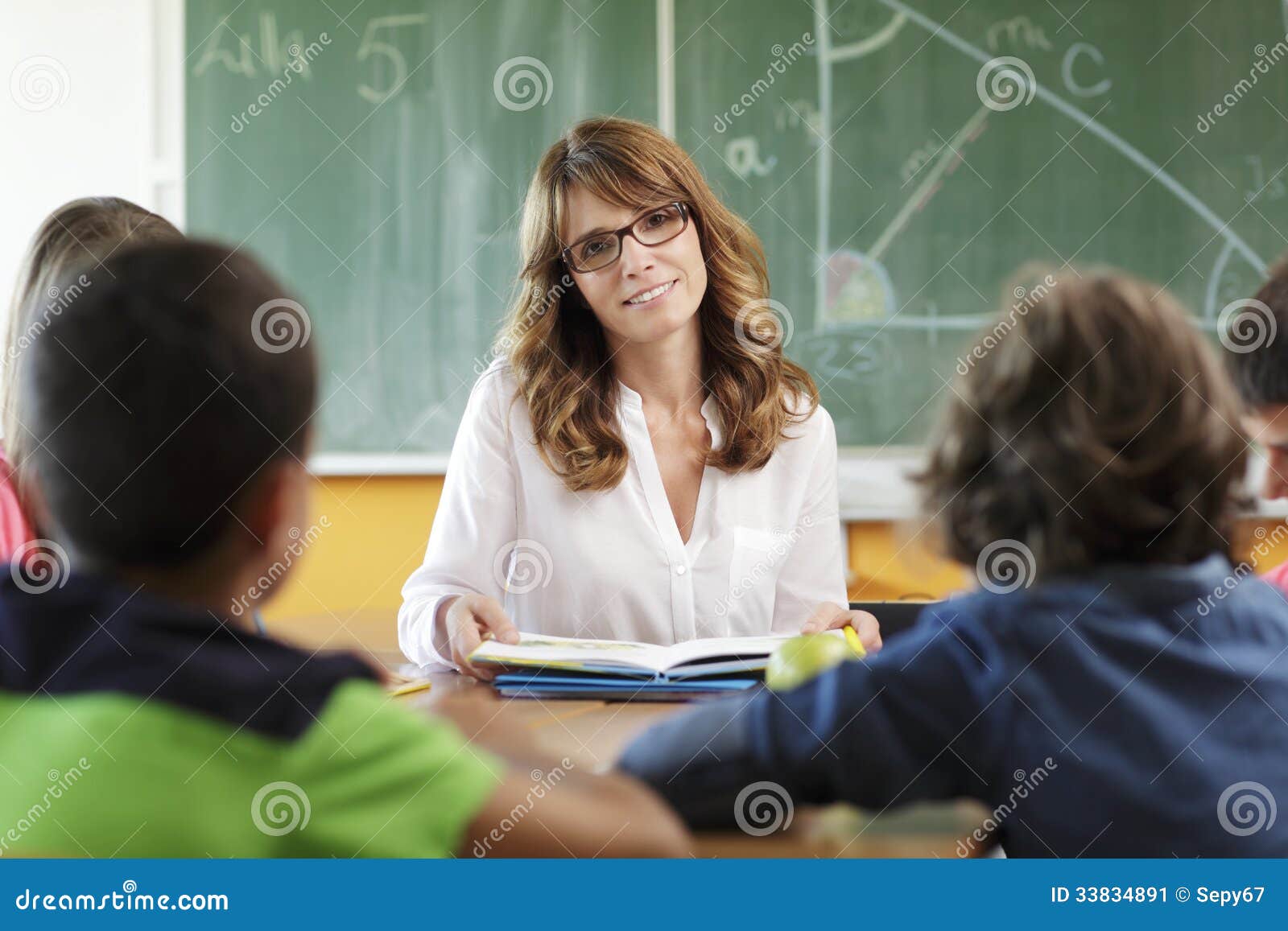 Insegnante E Studente Nella Lezione Immagine Stock - Immagine di uomini ...