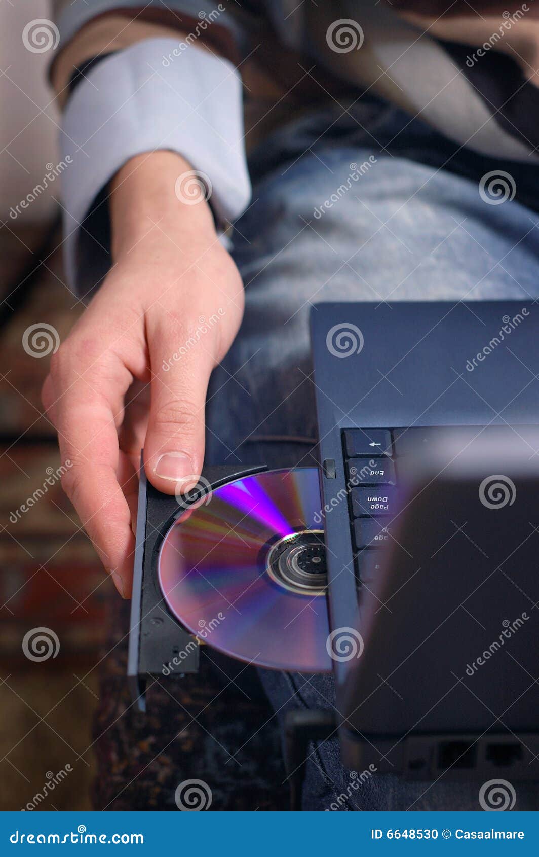 Insert disc in player stock photo. Image of computer, compact - 6648530