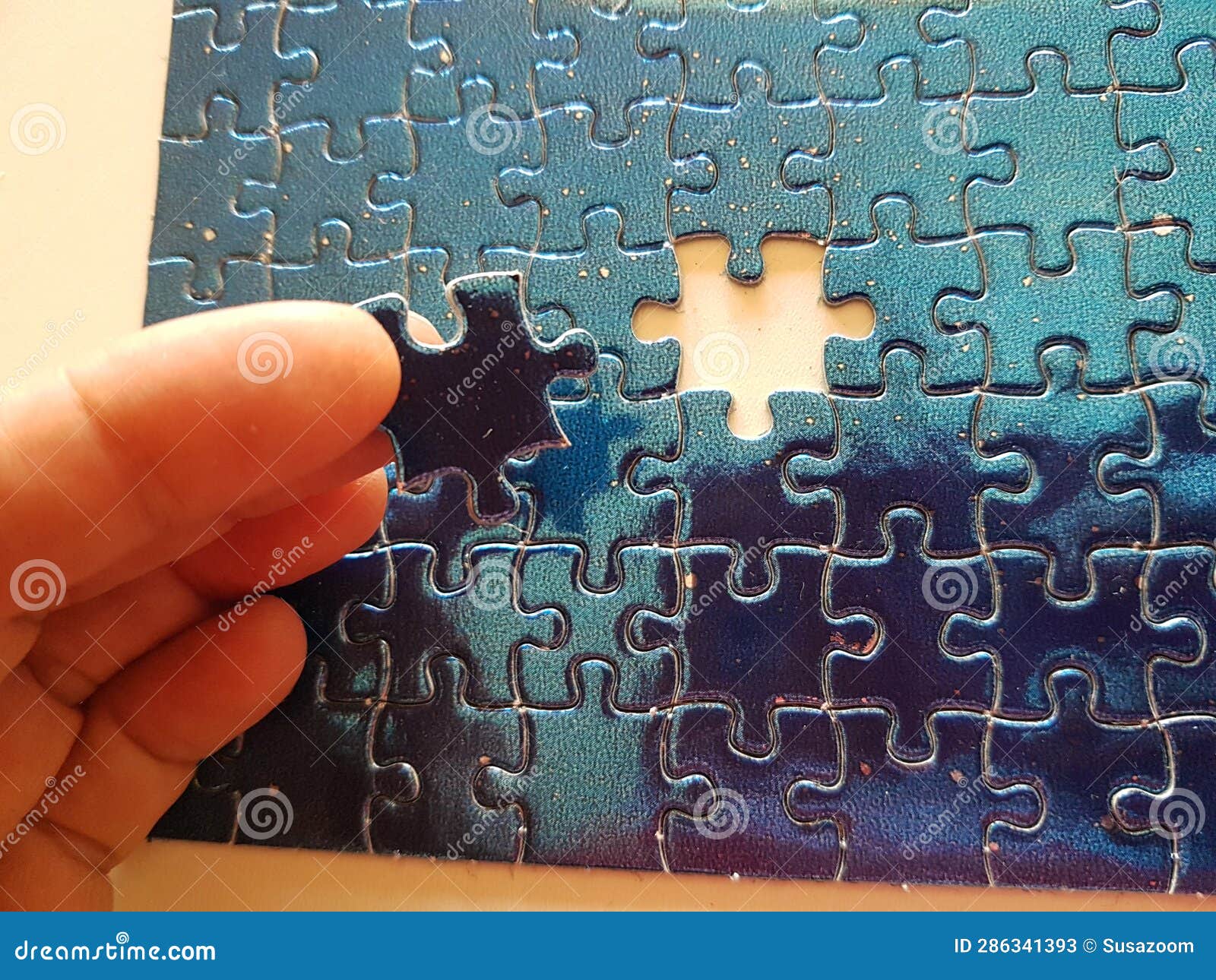 Insert the Last Piece of the Puzzle Stock Image - Image of insert, hand ...