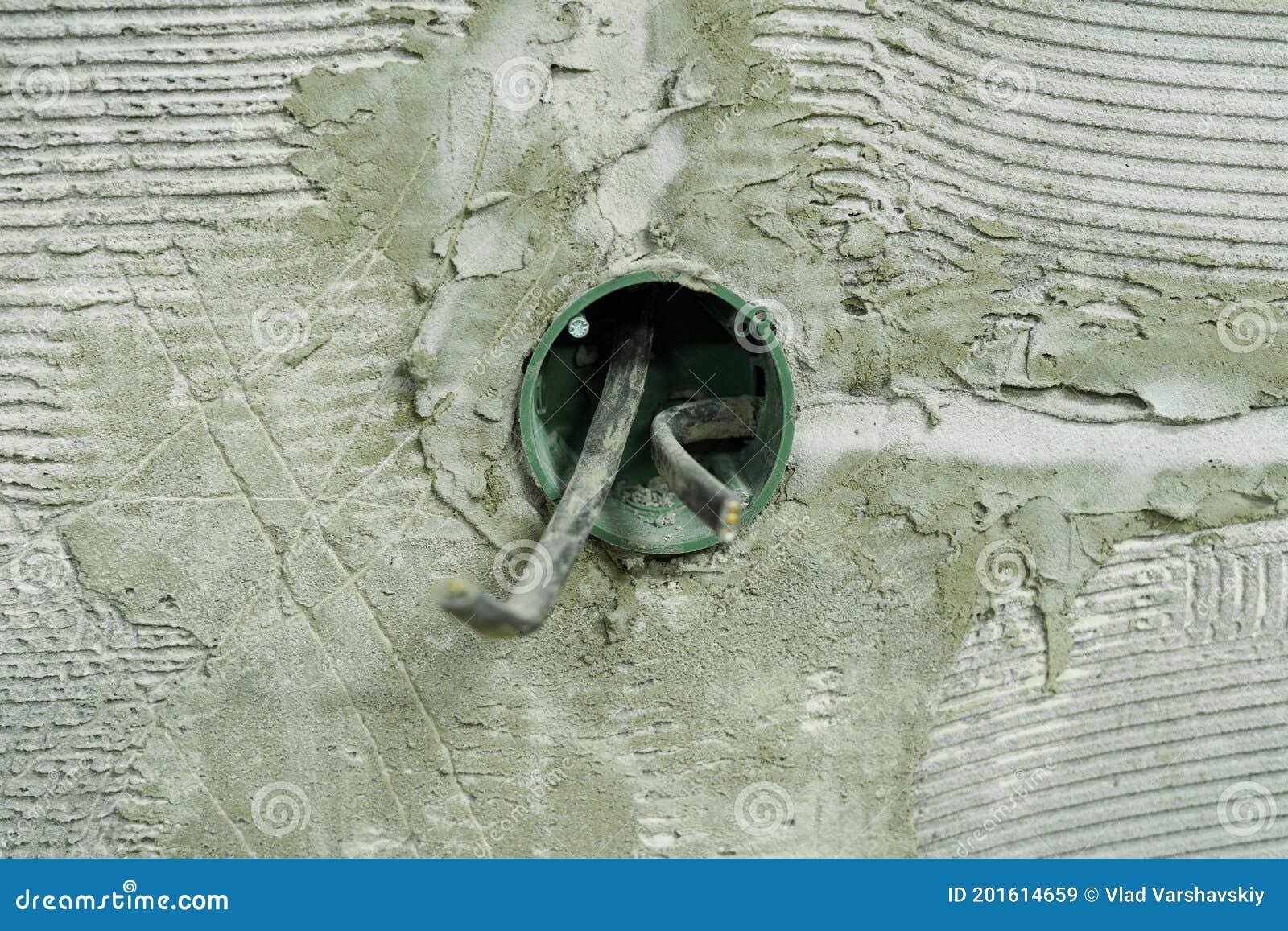 Inserted in the Wall for a Socket Outlet with Live Wires Protruding ...