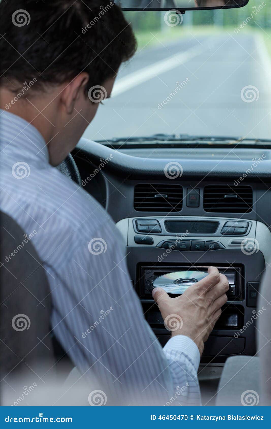 Inserting CD in the car stock photo. Image of dangerous - 46450470