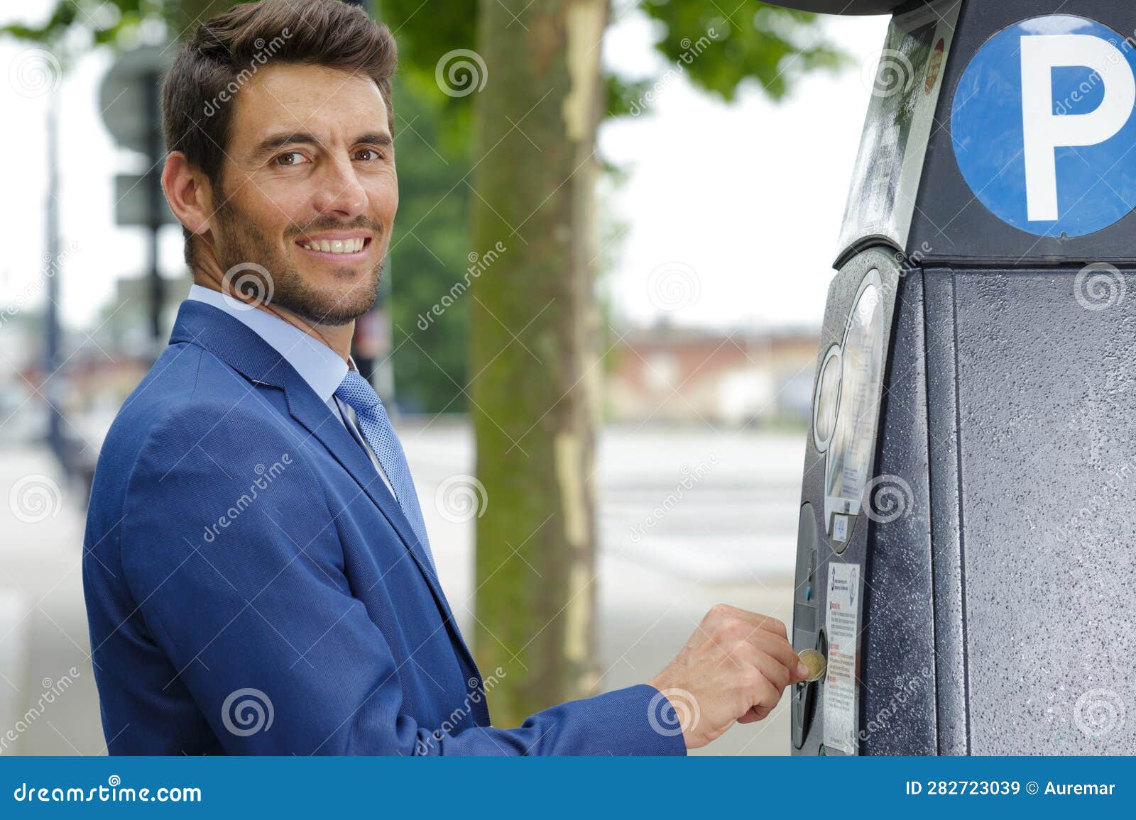 Inserting Coin into Parking Meter Stock Image - Image of urban, time ...