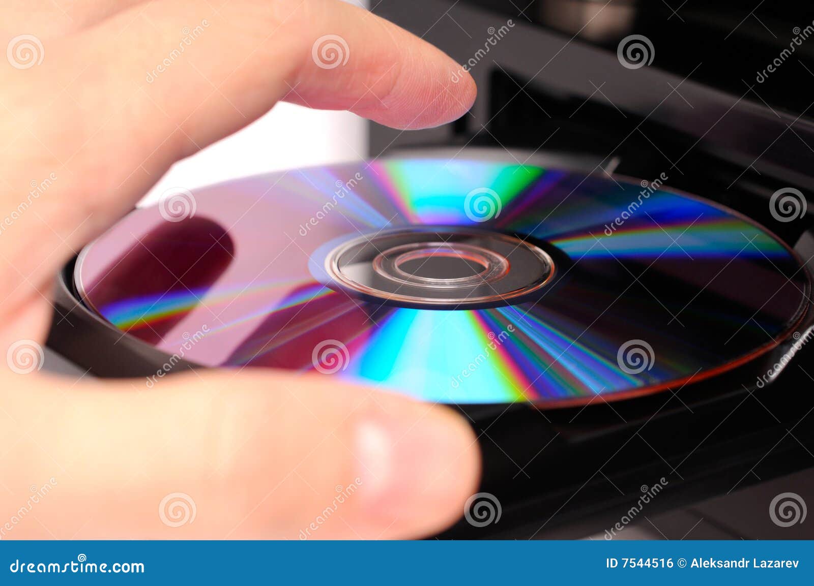 Inserting a disc stock photo. Image of inserting, audio - 7544516