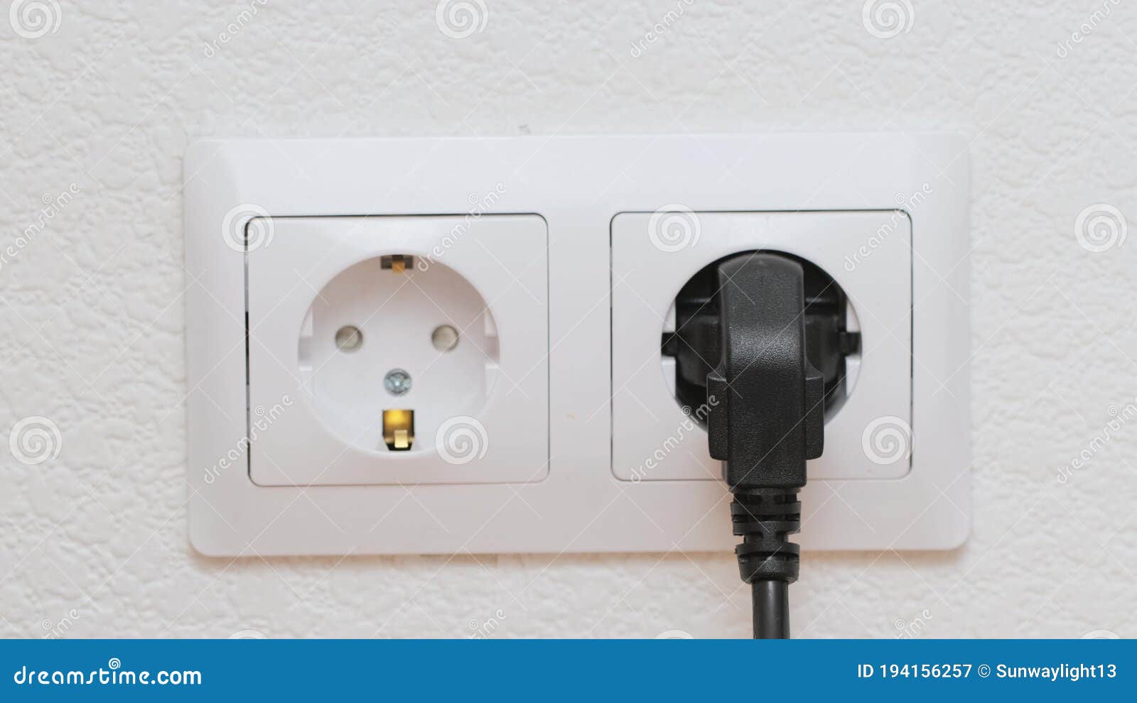 Inserting an Electric Plug in Socket on the Wall Close Up Stock Image ...