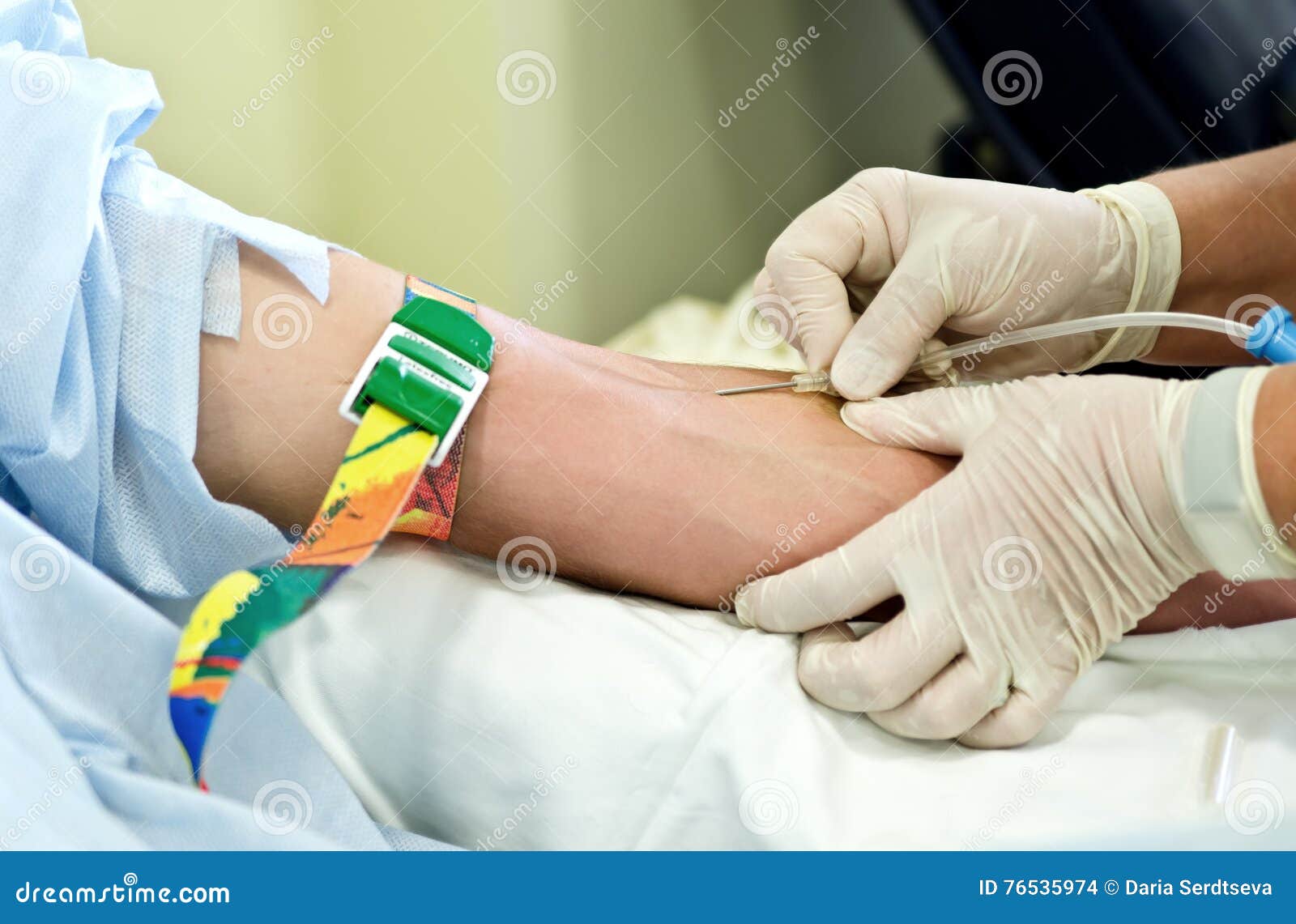 Inserting a Needle into a Vein Hands for Blood Sampling Stock Photo ...