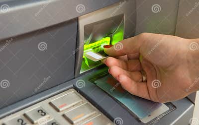 Inserting Plastic Card Visa into ATM Stock Photo - Image of automatic ...