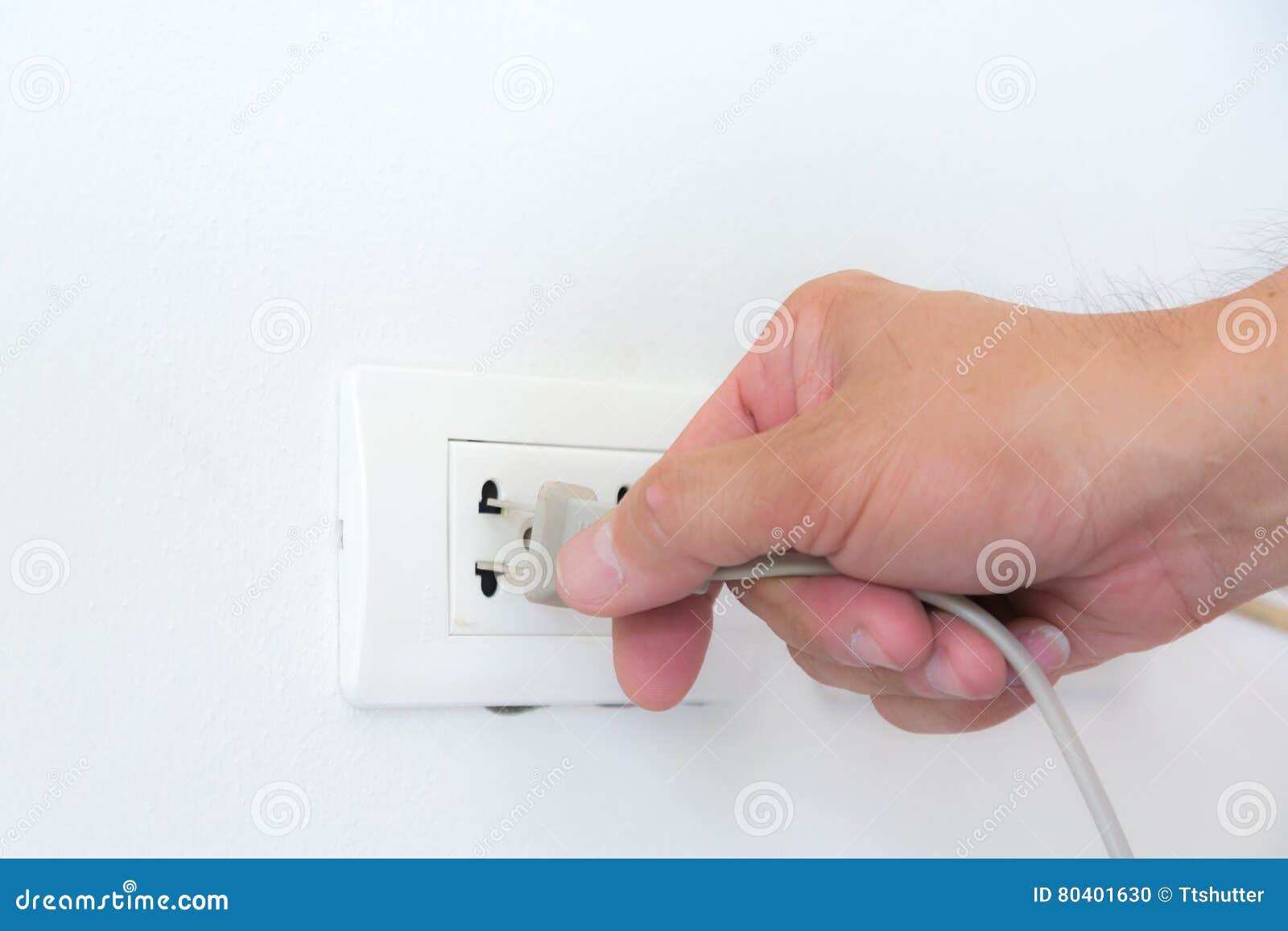Inserting plug in outlet. stock photo. Image of background - 80401630