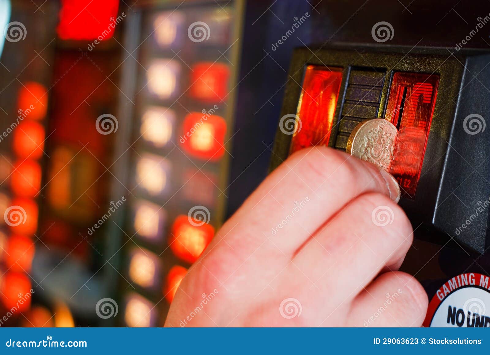 Inserting Pound Sterling Coin into Gaming Machine Stock Image - Image ...