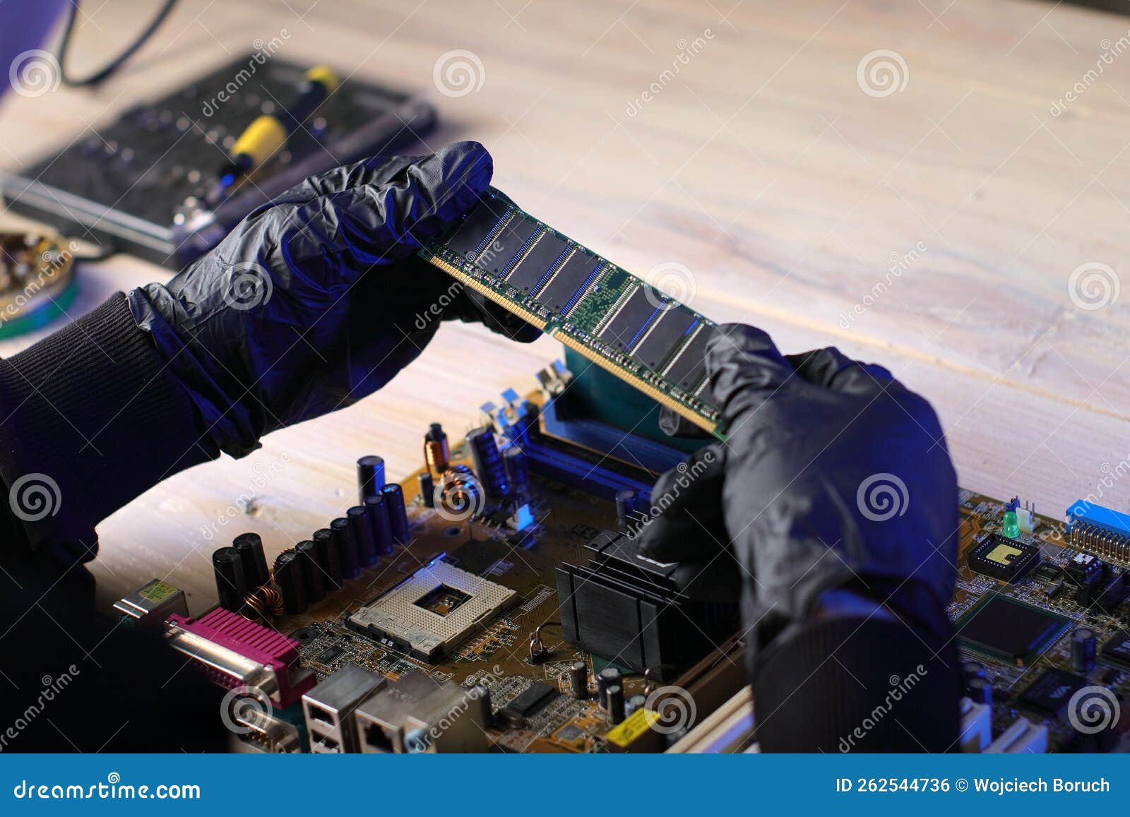 Inserting Ram Into Motherboard From Computer On Table Royalty-Free ... Inserting Ram Into Motherboard From Computer On Table Royalty-Free ...