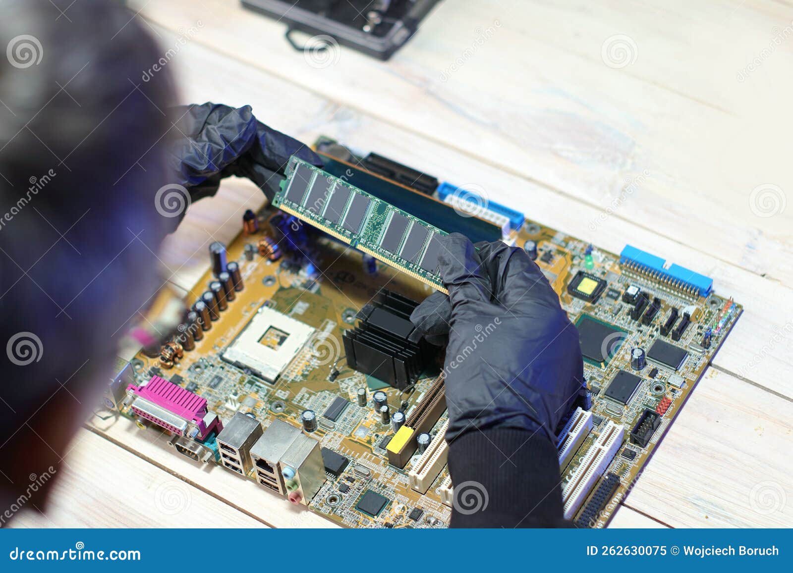 Inserting Motherboard In To Computer Case Royalty-Free Stock Photo ...