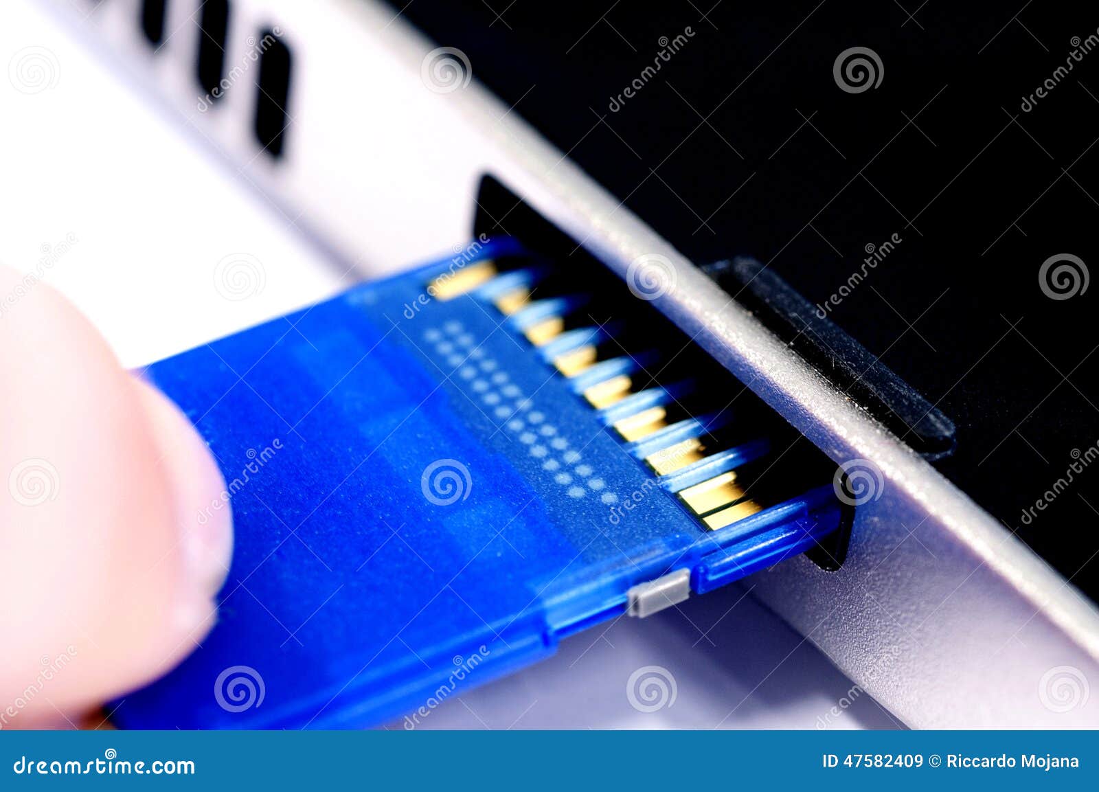 Inserting SD card stock image. Image of card, hand, memories - 47582409