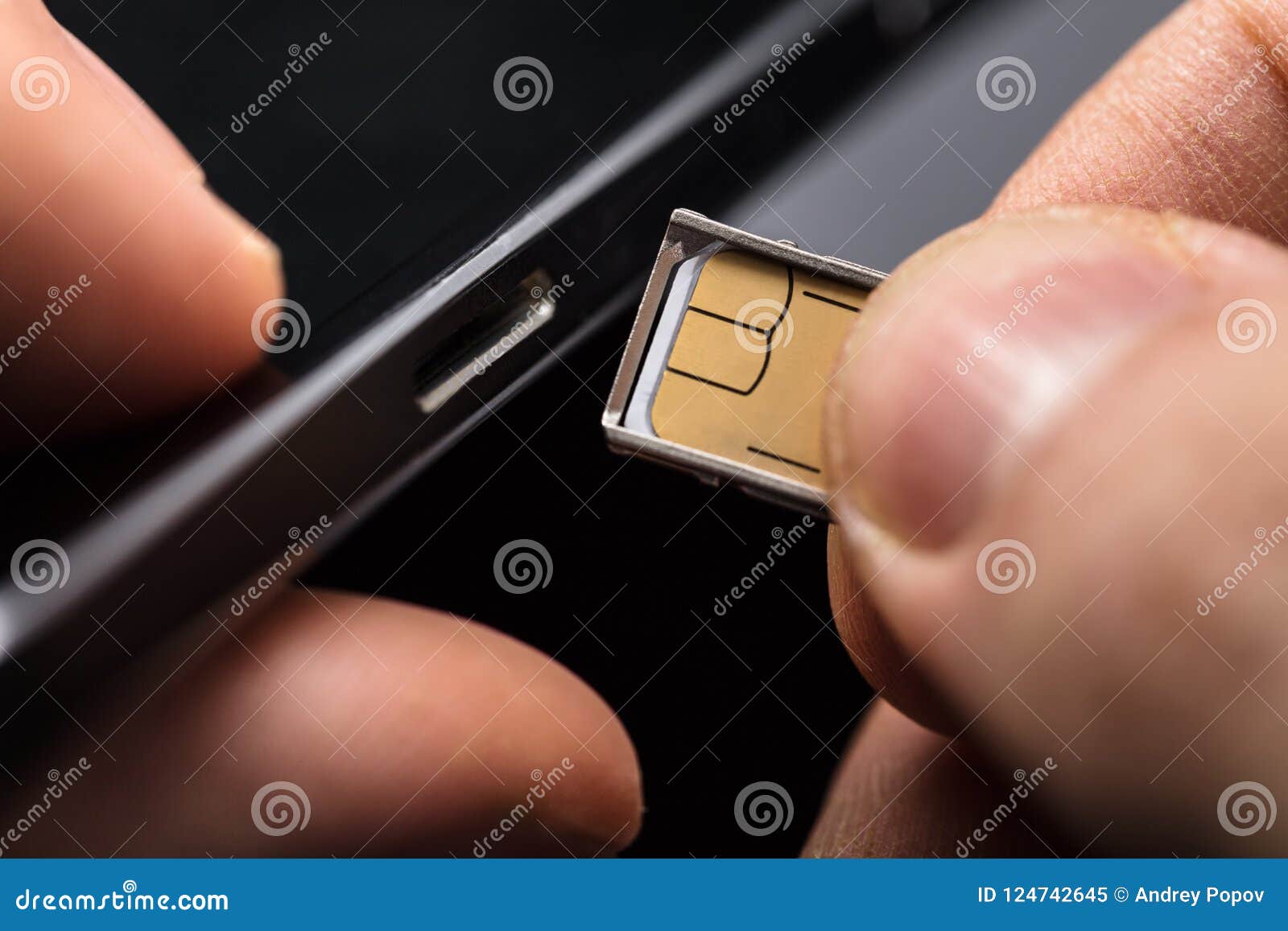 Inserting a Sim Card in a Mobile Phone Stock Image - Image of card ...