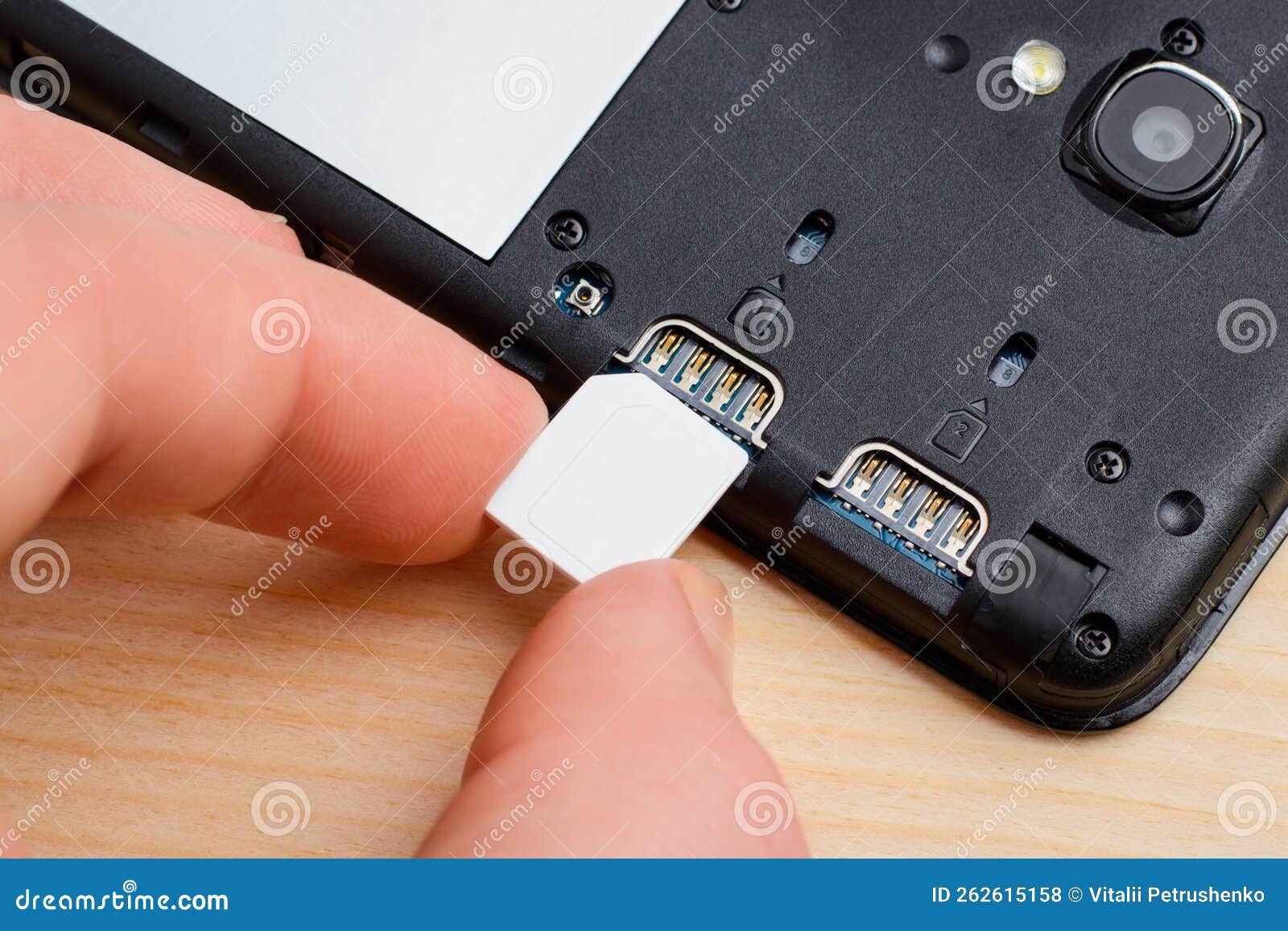 Inserting SIM card stock photo. Image of insert, mobile - 262615158