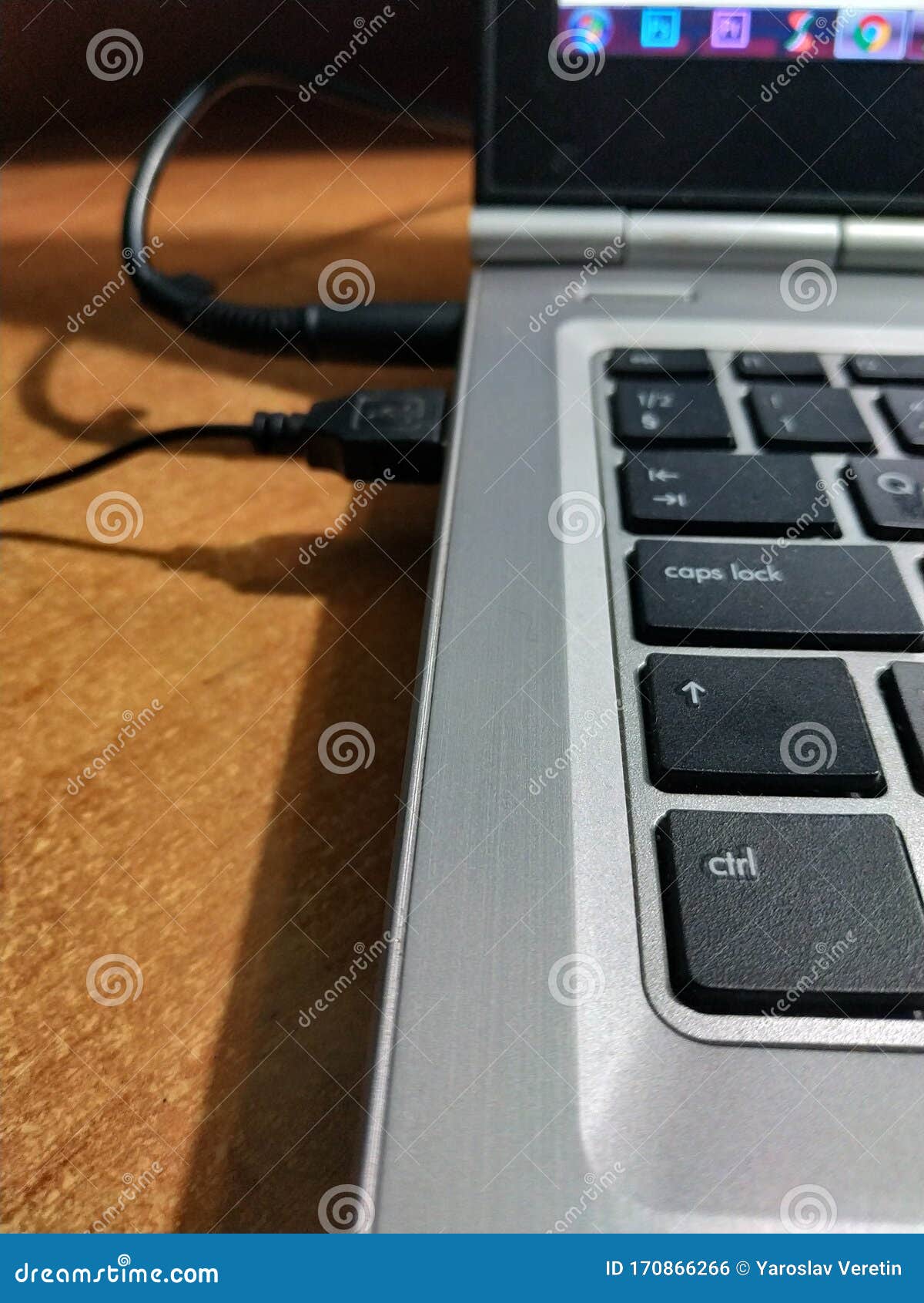 Inserting White USB Cable into Laptop on White Purple Background Stock ...