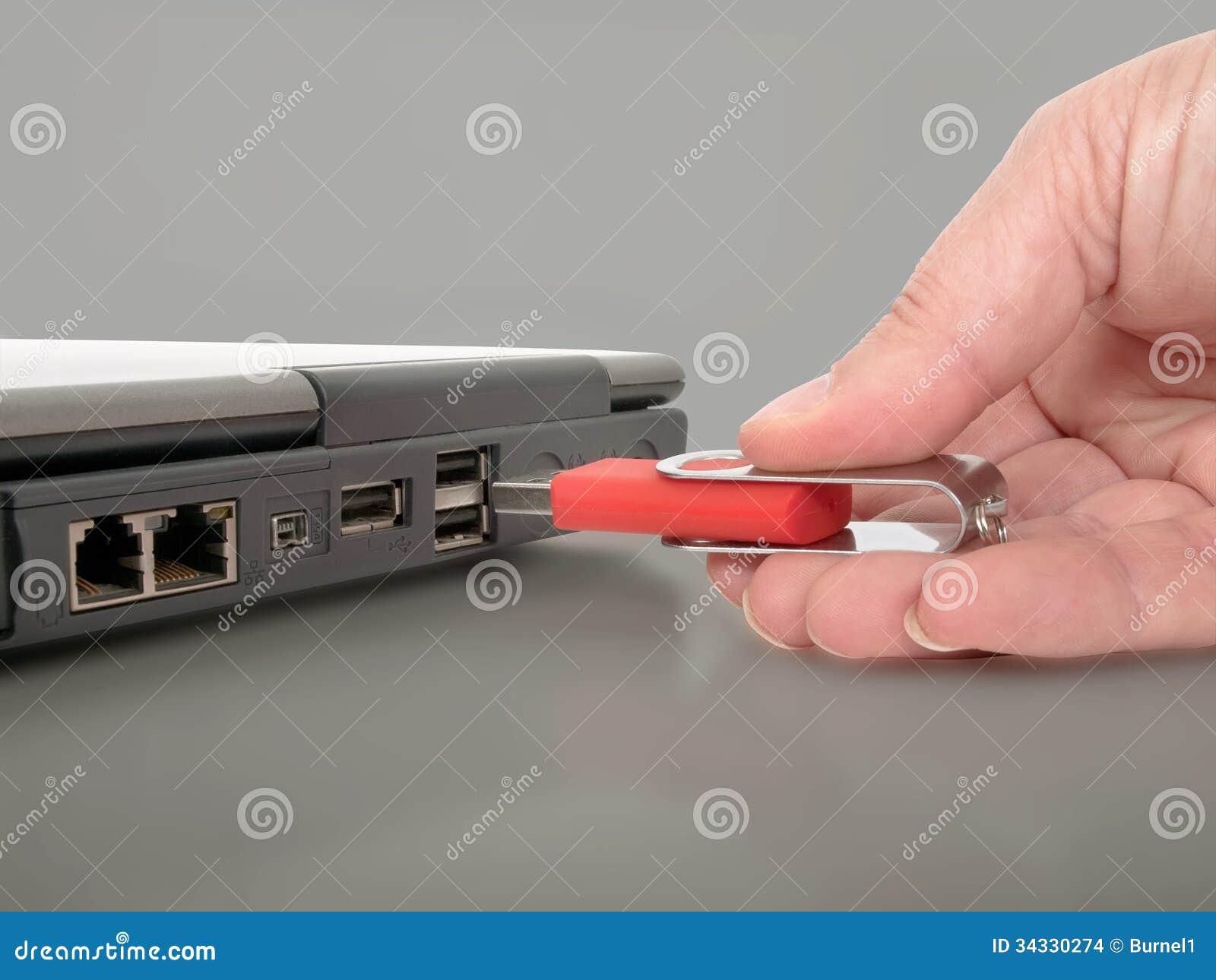 Inserting usb memory stick stock photo. Image of medium - 34330274