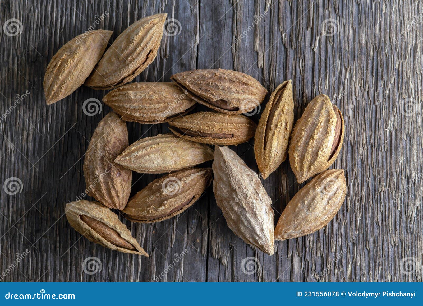 Inshell Almonds on a Background of Rough Wood Texture Stock Photo ...