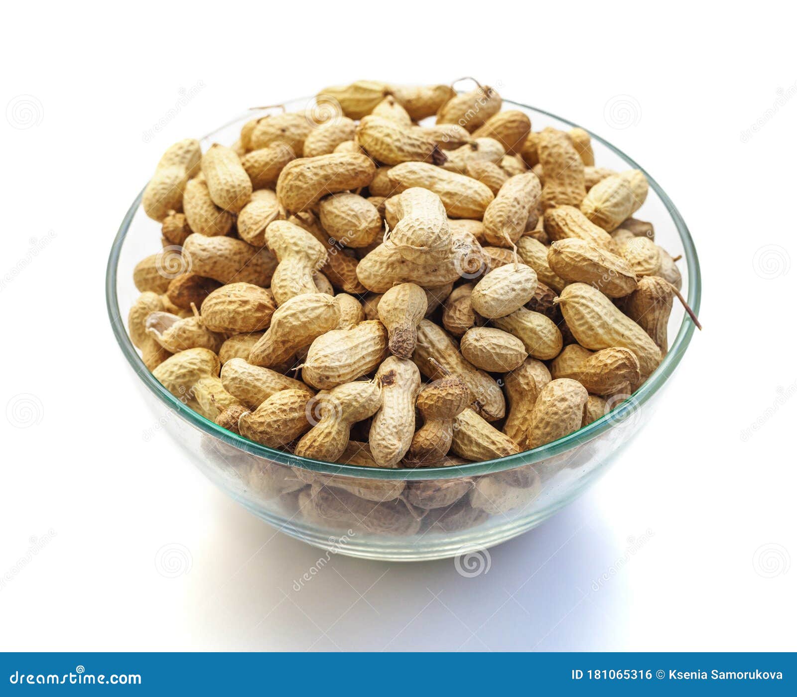 Inshell Peanuts Spilled Out Of A Bucket On A White Wooden Background ...