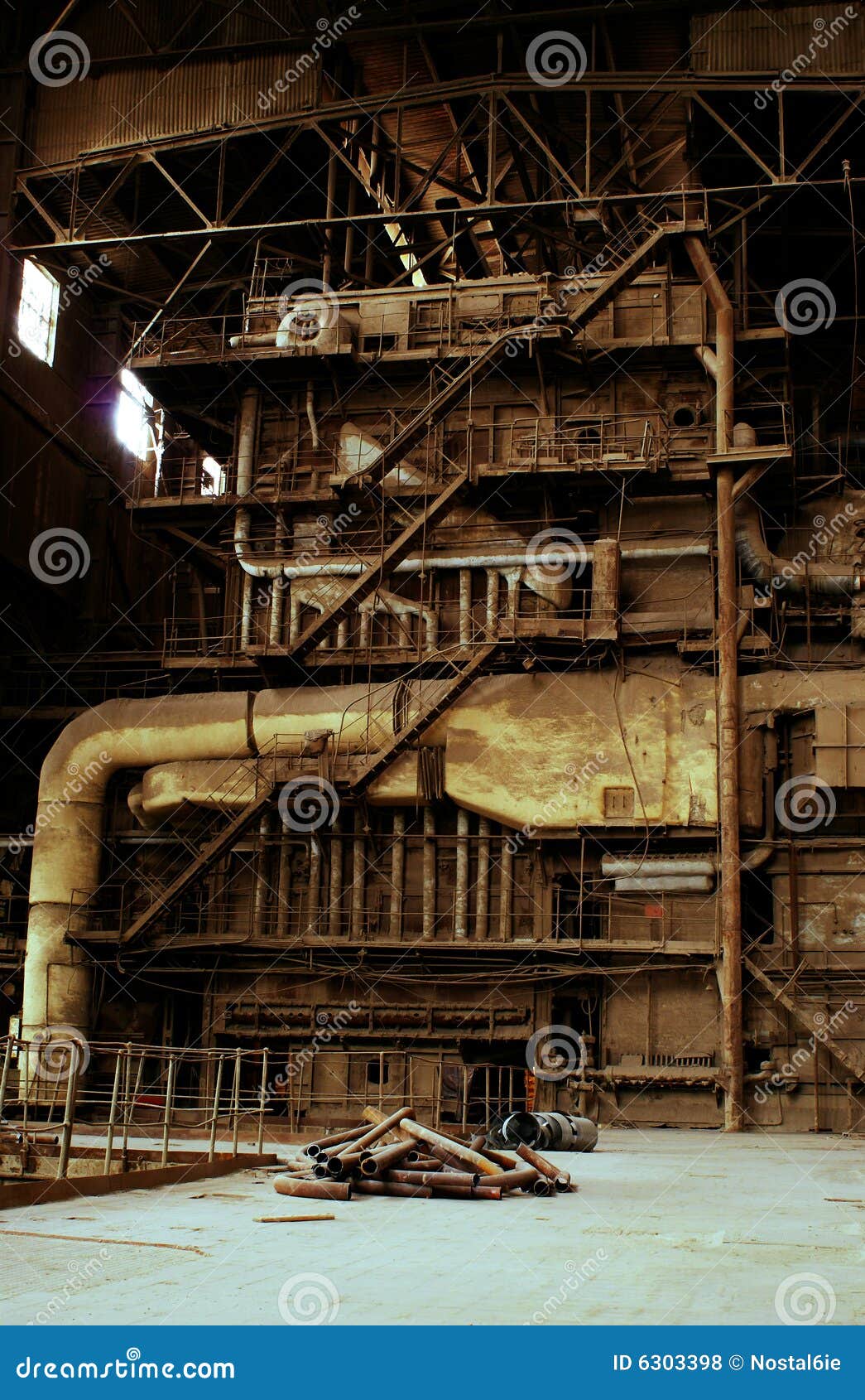 Old Rusty Industrial Tanks Connected By Pipes Connected With Valves In ...
