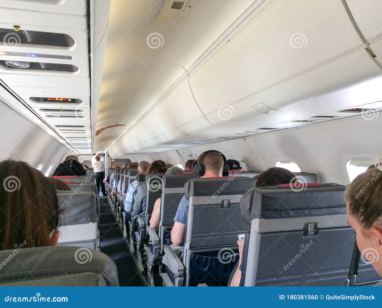 Inside Airplane Cabin Editorial Photo | CartoonDealer.com #141017525