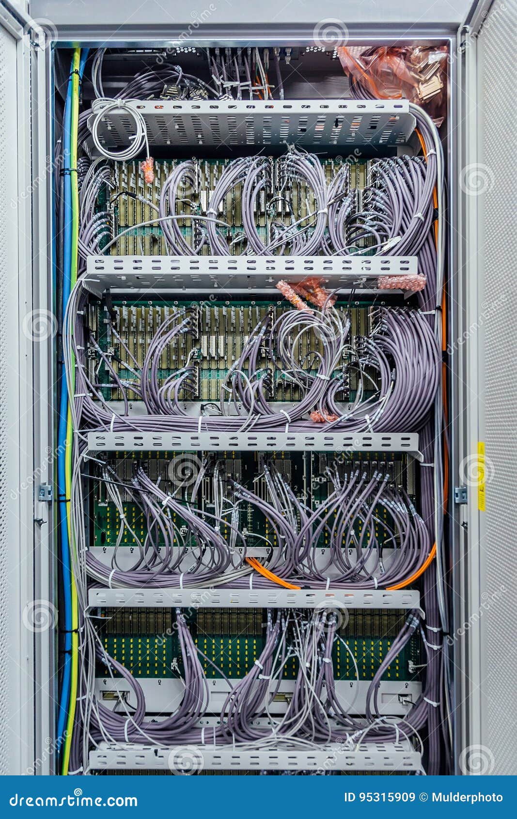 Inside the Cabinet with Telecommunication Mobile Network Equipment with ...