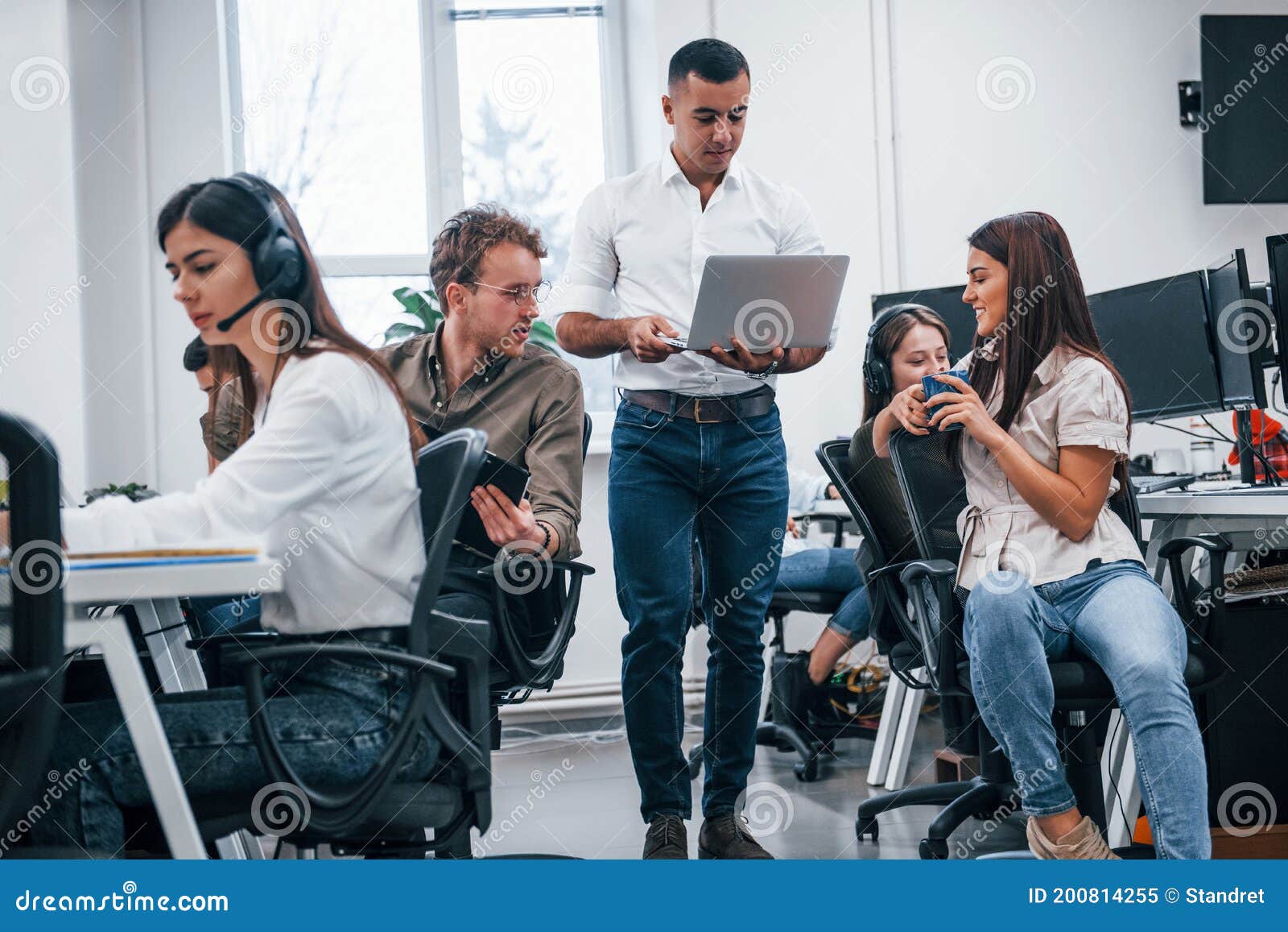 Inside of Call Center. Young Business People Working Together in the ...