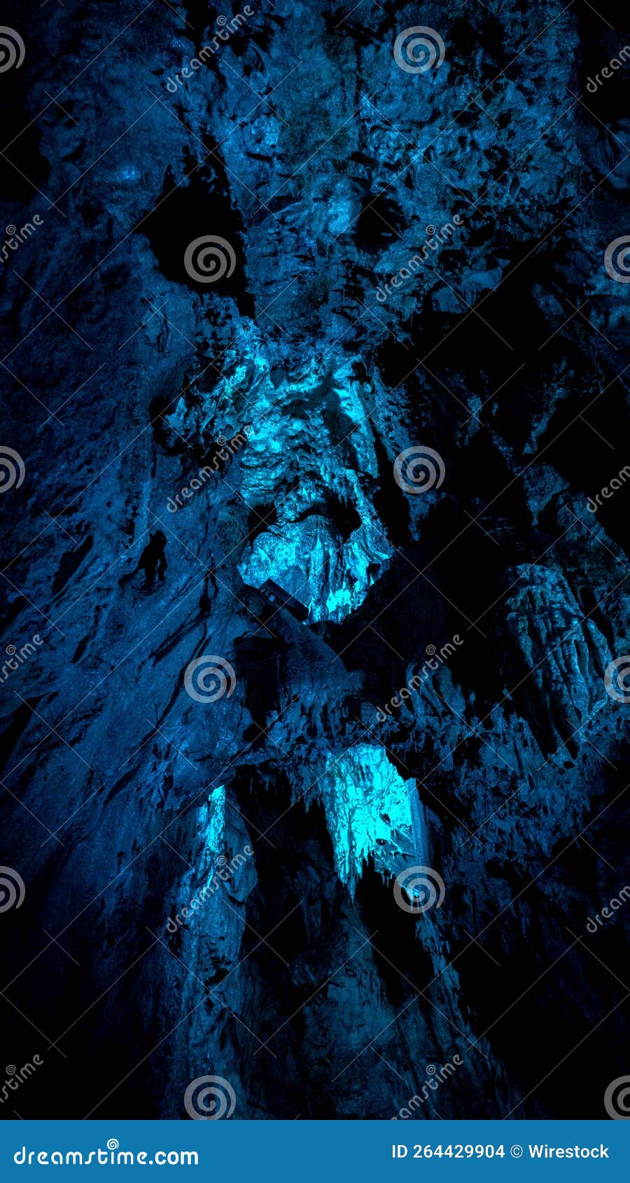 Inside of a Cave Lit Up in Blue Light Stock Photo - Image of rock ...