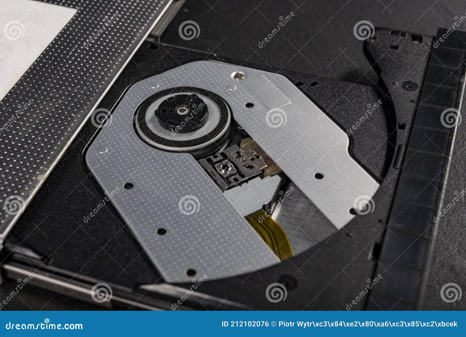 The Inside of the CD Reader. a Laser Mechanism for Reading Compact ...