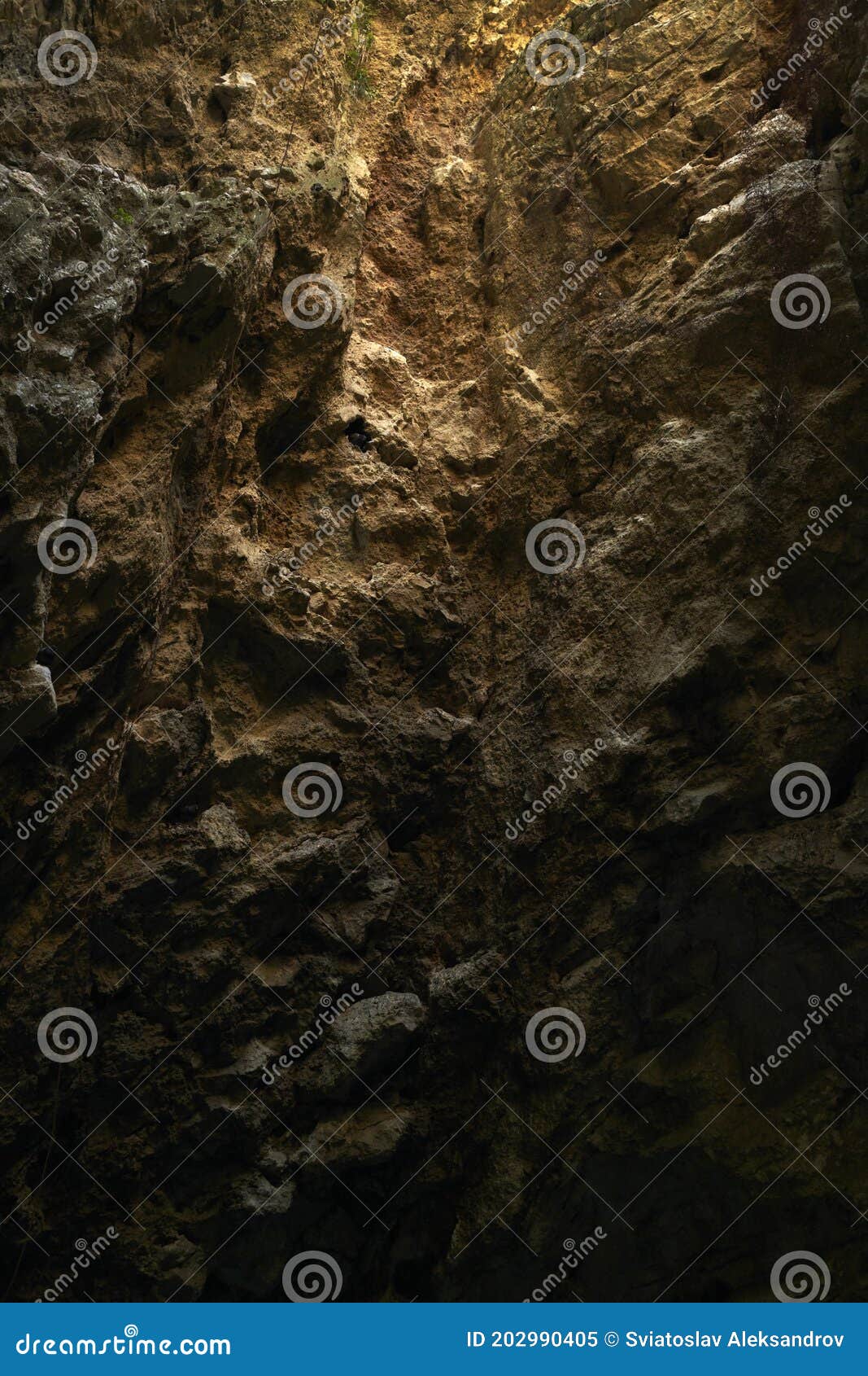 Inside a dark rock cave stock image. Image of contrast - 202990405