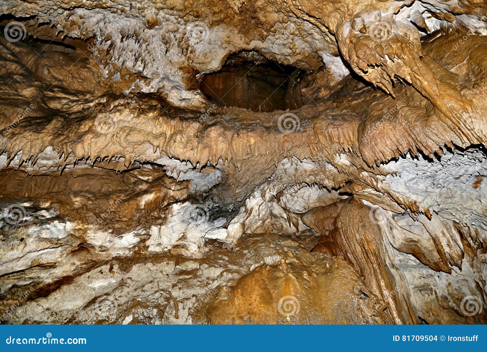 Inside a deep cave stock photo. Image of stalagmite, brown - 81709504