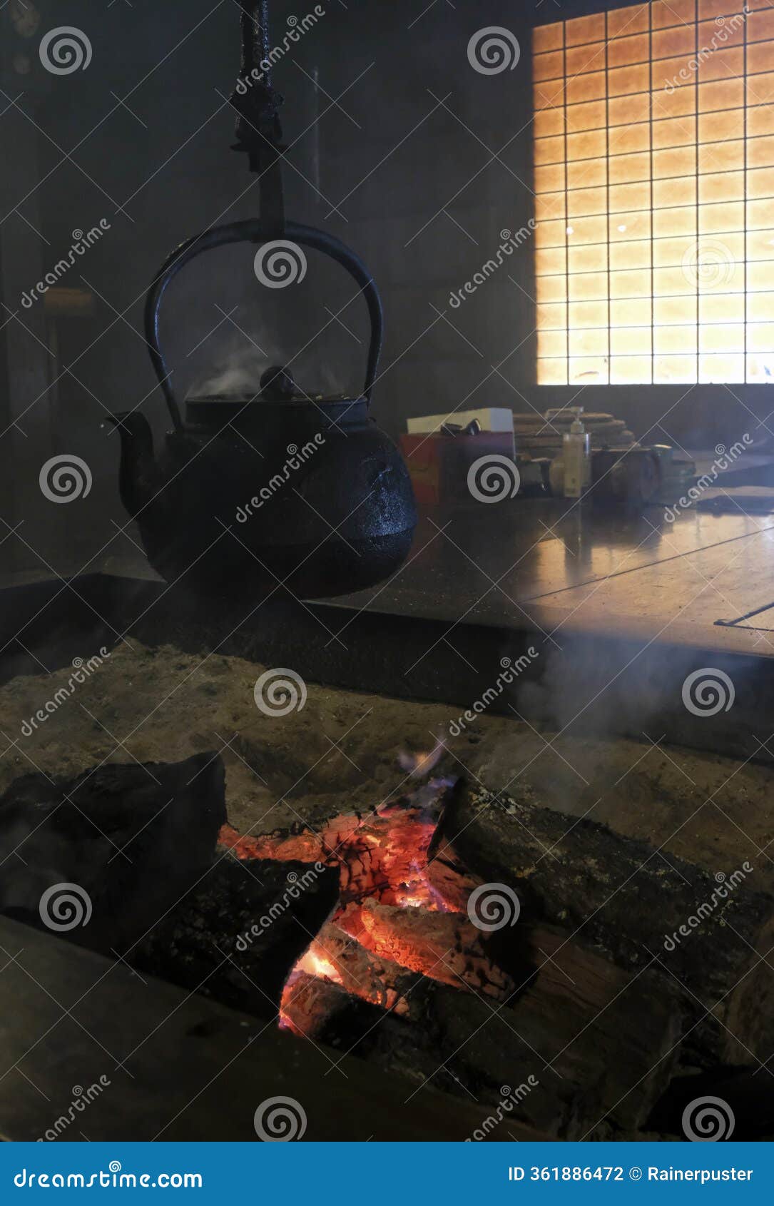 Inside a Dimly Lit Traditional Japanese House with Fire Pit and Tea ...