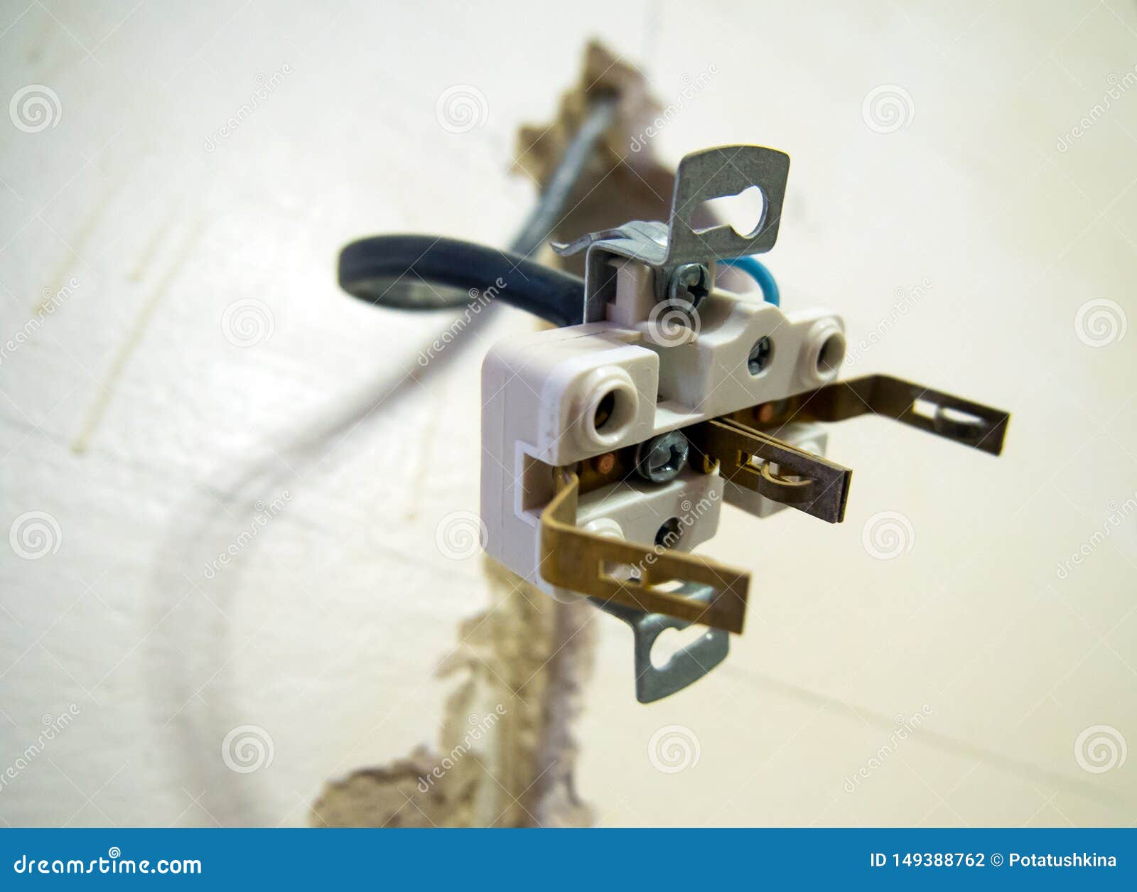 The Inside of the Electrical Outlet is Hanging on the Cable Stock Photo ...