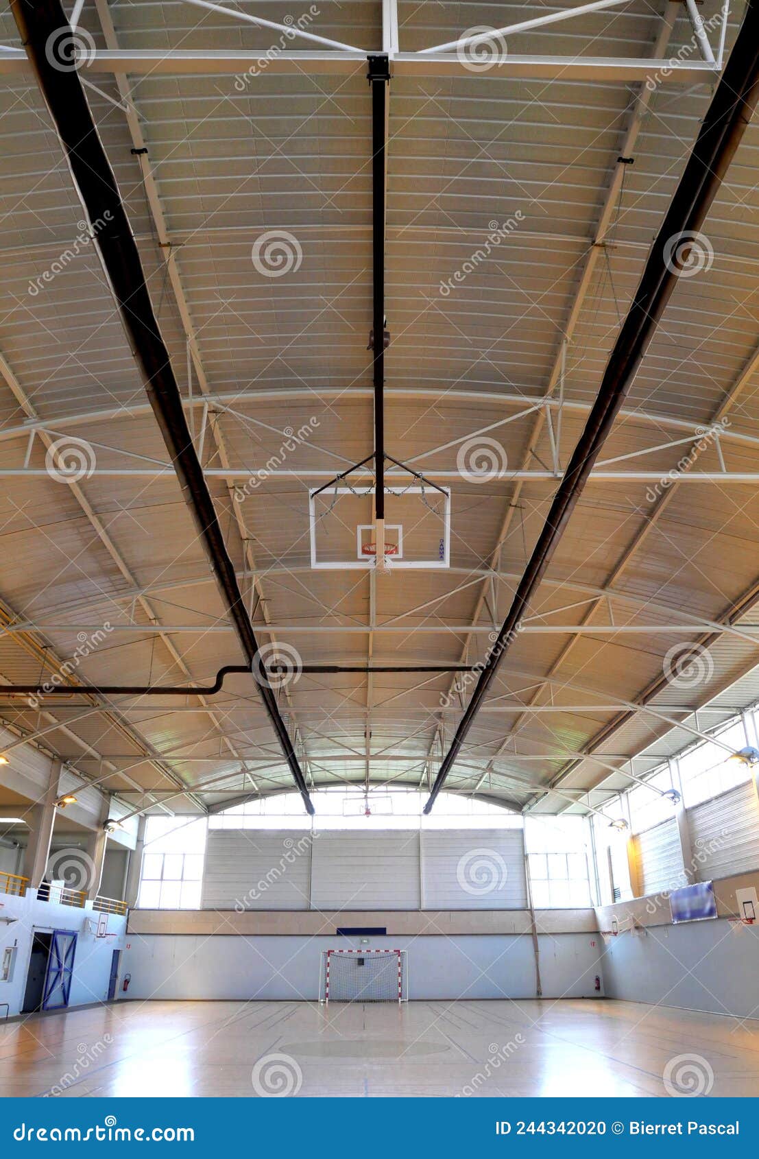 Inside an empty gymnasium stock photo. Image of parquet - 244342020