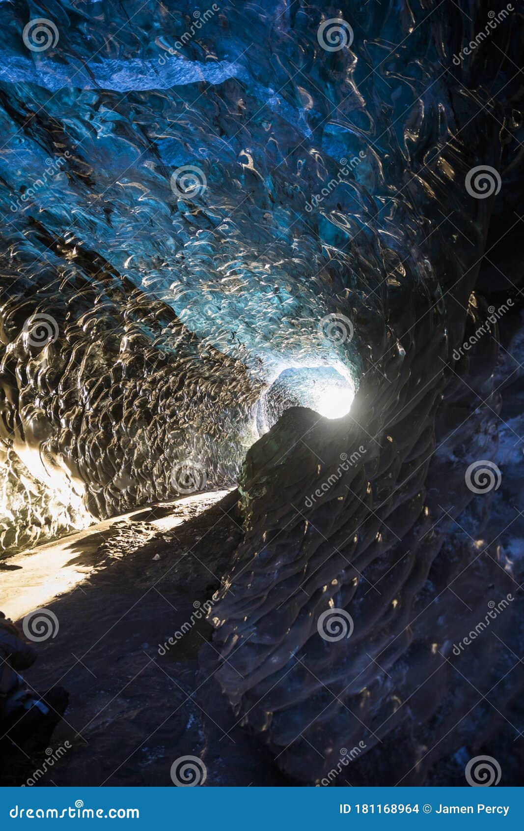 Inside ice cave tunnel stock photo. Image of female - 181168964