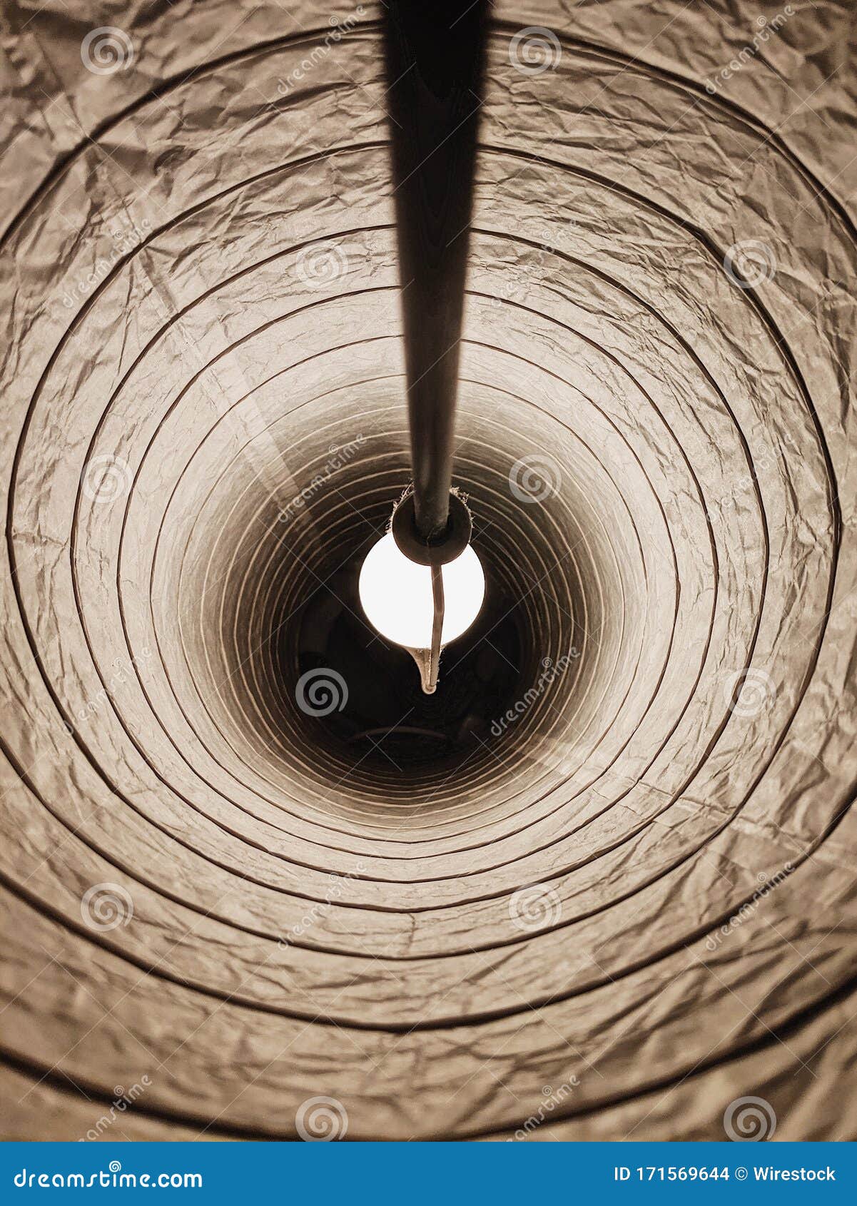 Inside of a Lampshade with a White Lightbulb Turned on in a Dark Room ...