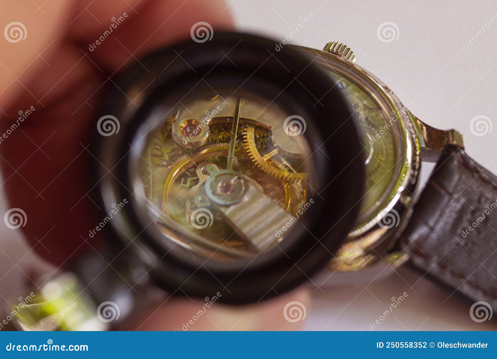 Inside of Watch Seen through Magnifying Glass at Watchmaker. Stock ...