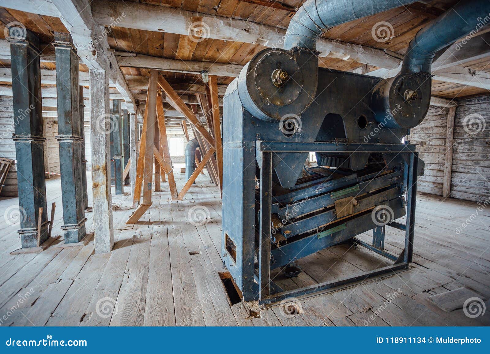 Inside Old Abandoned Wooden Mill with Old Equipment Stock Photo - Image ...